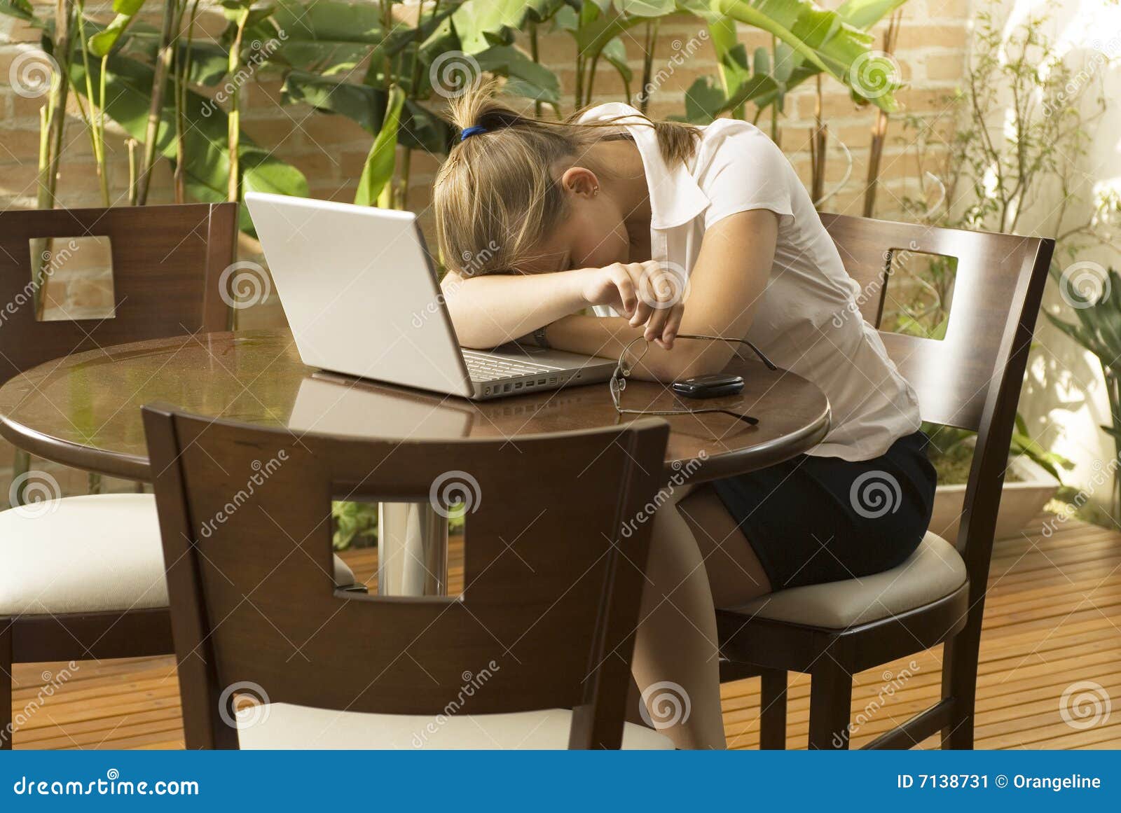 Tired woman with Laptop stock image. Image of outdoors - 7138731