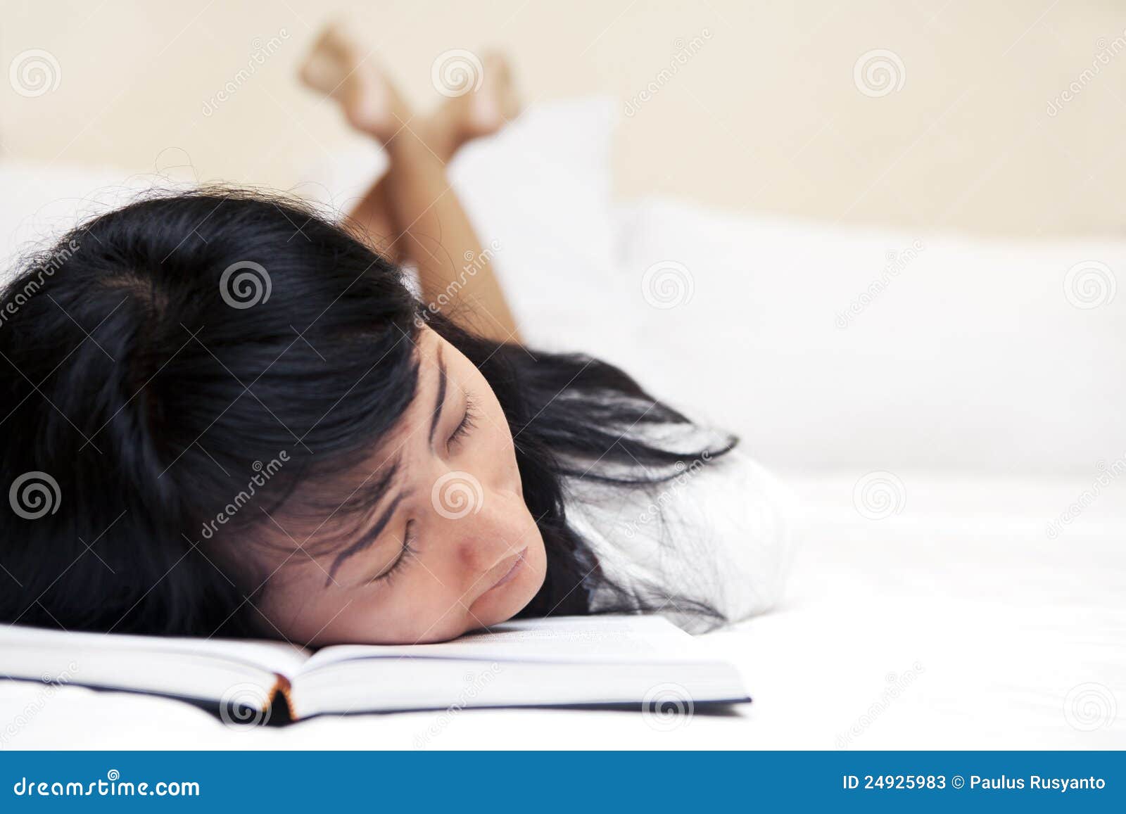 Tired woman reading a book stock image. Image of attractive - 24925983