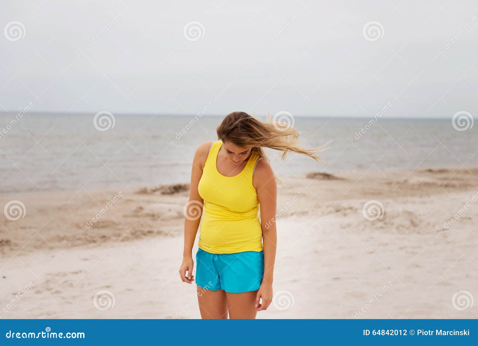 Tired Woman Standing on the Beach Stock Photo - Image of coastline ...