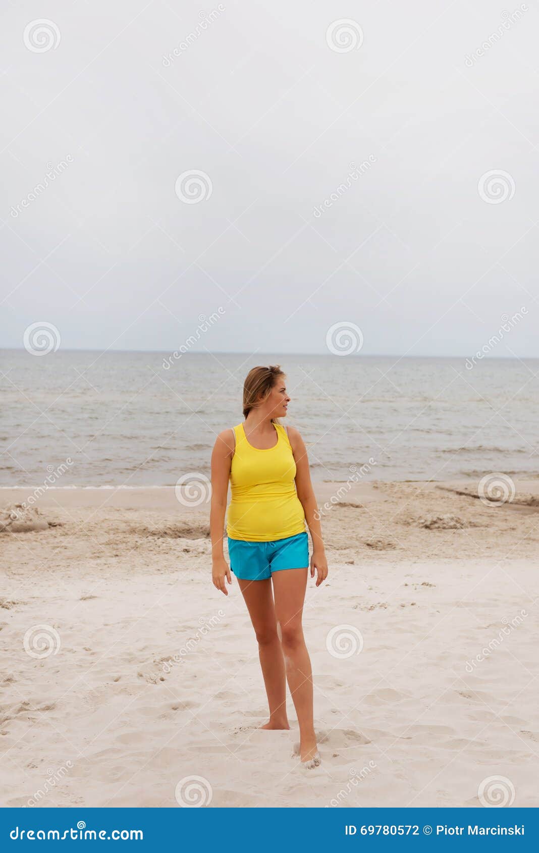 Tired Woman Standing on the Beach Stock Photo - Image of outdoors ...