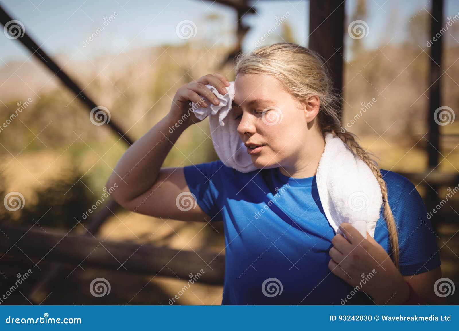 Tired Woman Wiping Sweat after Workout during Obstacle Course Stock ...