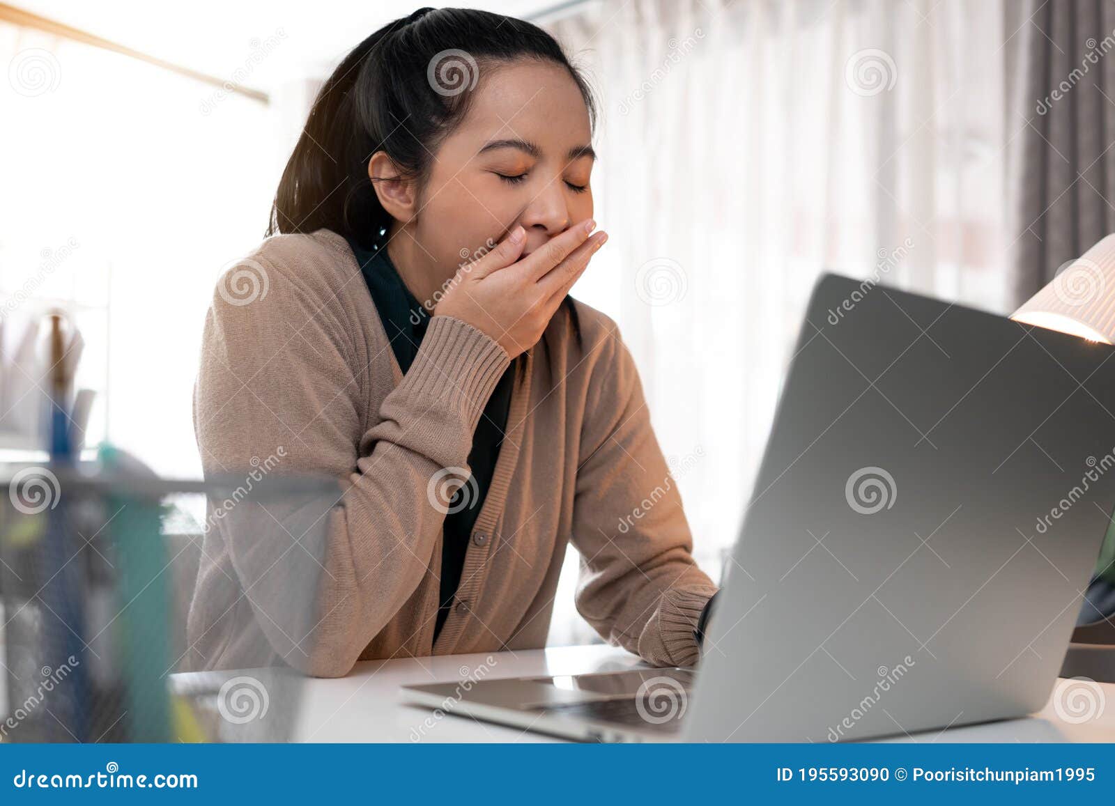 Tired Woman Yawning and Working at Home Stock Photo - Image of ...