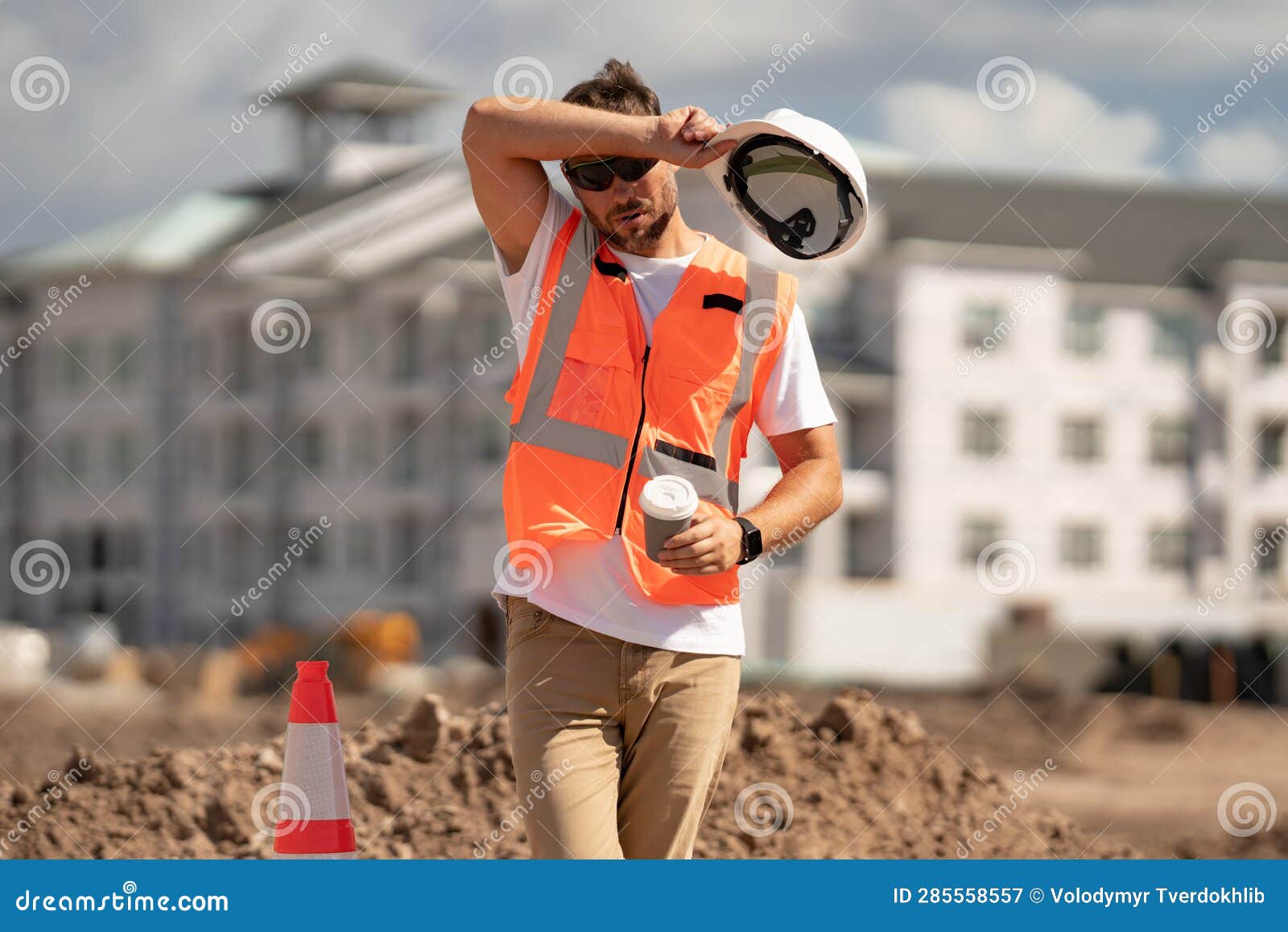 Tired Worker. Worker Man on the Building Construction. Construction ...