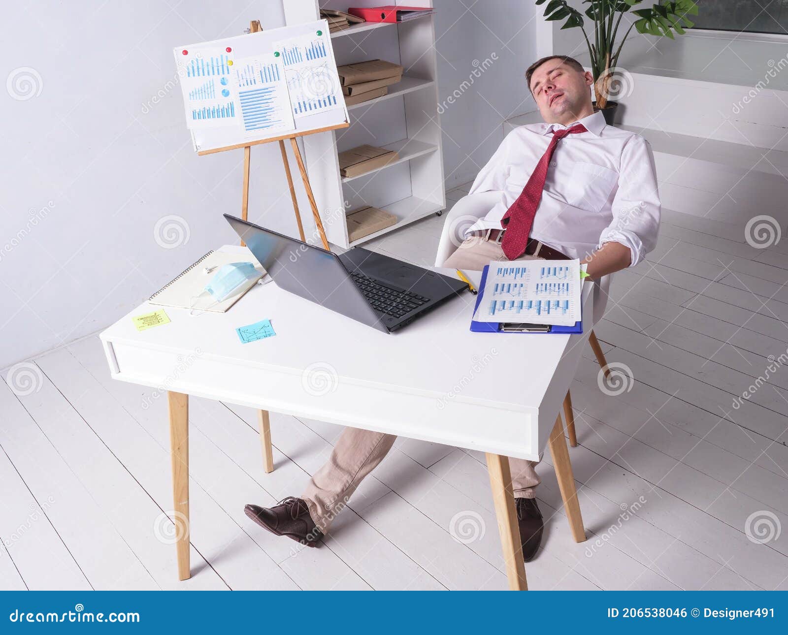 Tired Worker Sleeping Alone at Night in the Office at Work. Stock Photo ...