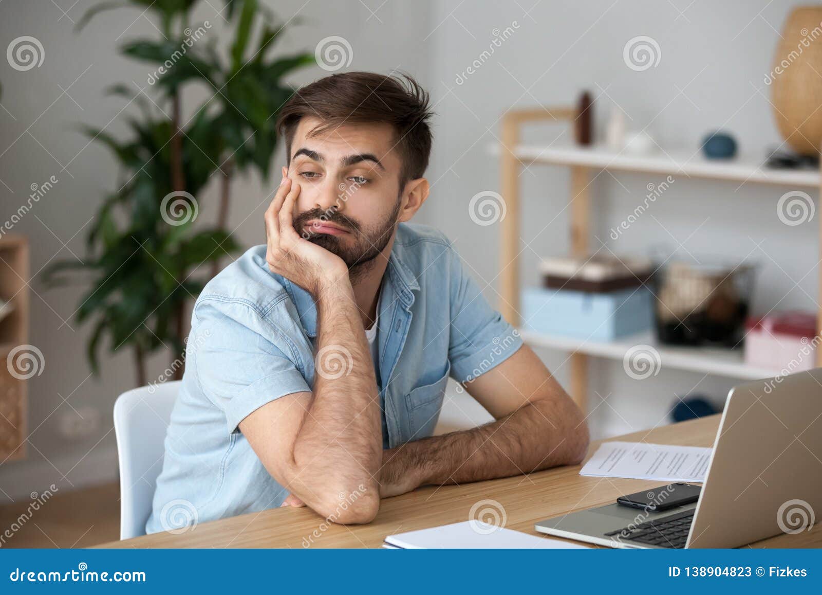 Tired Worker Wasting Time at Workplace Distracted from Boring Job Stock ... Tired Worker Wasting Time at Workplace Distracted from Boring Job Stock ...