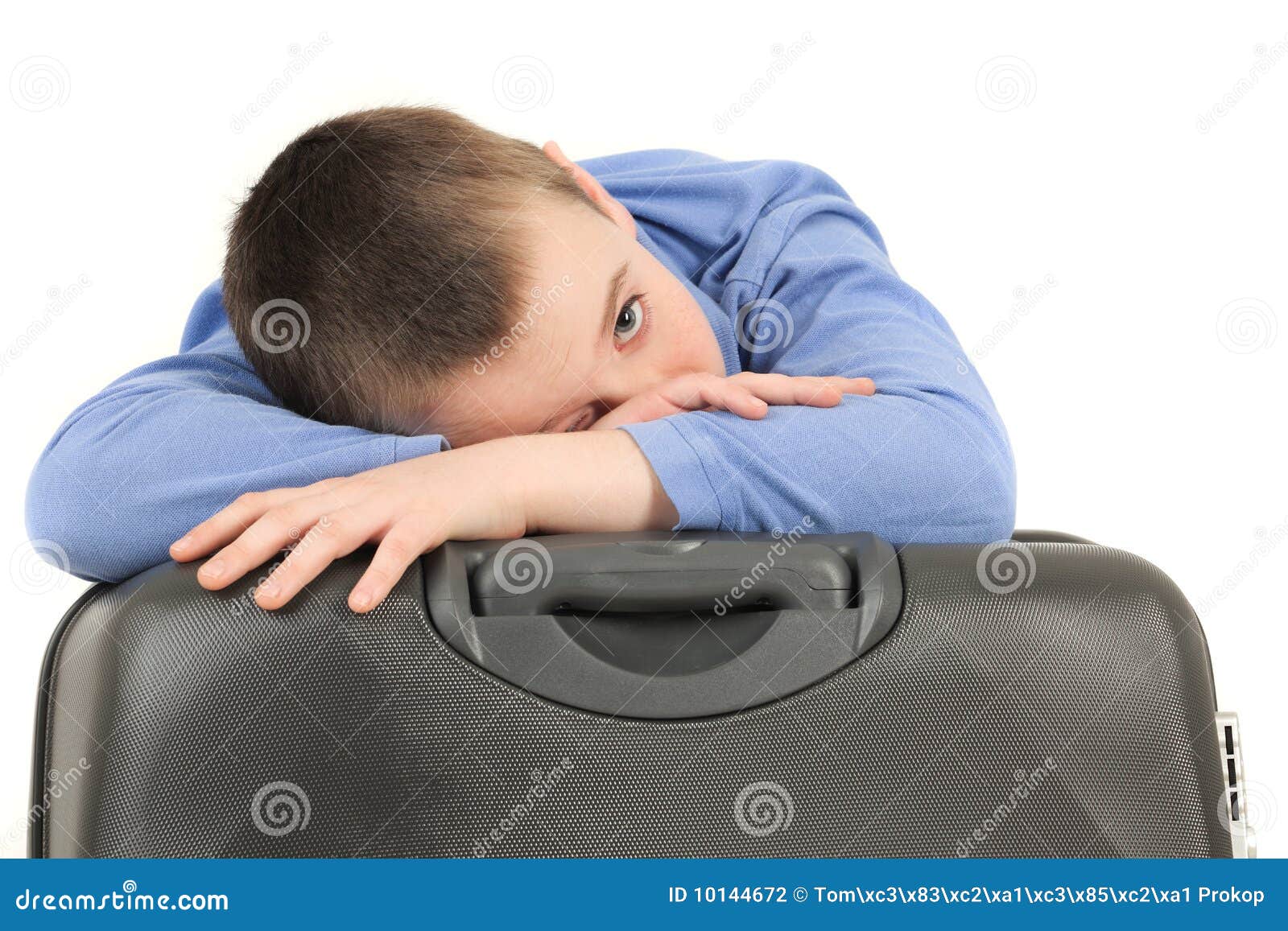 Tired young boy stock photo. Image of baggage, brown - 10144672