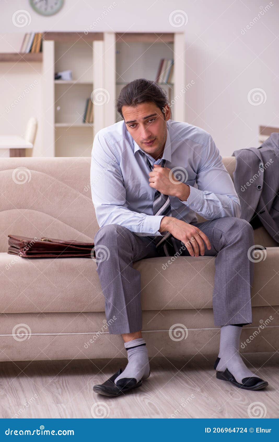 Tired Young Businessman Coming Home after Working Day Stock Photo ...