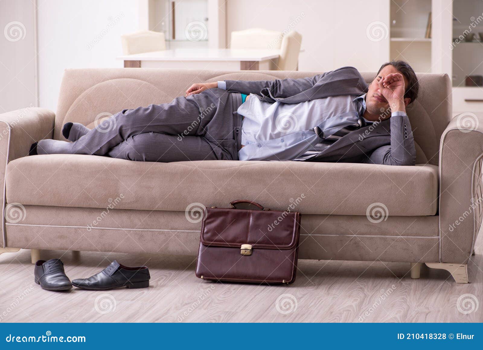 Tired Young Businessman Coming Home after Working Day Stock Photo ...