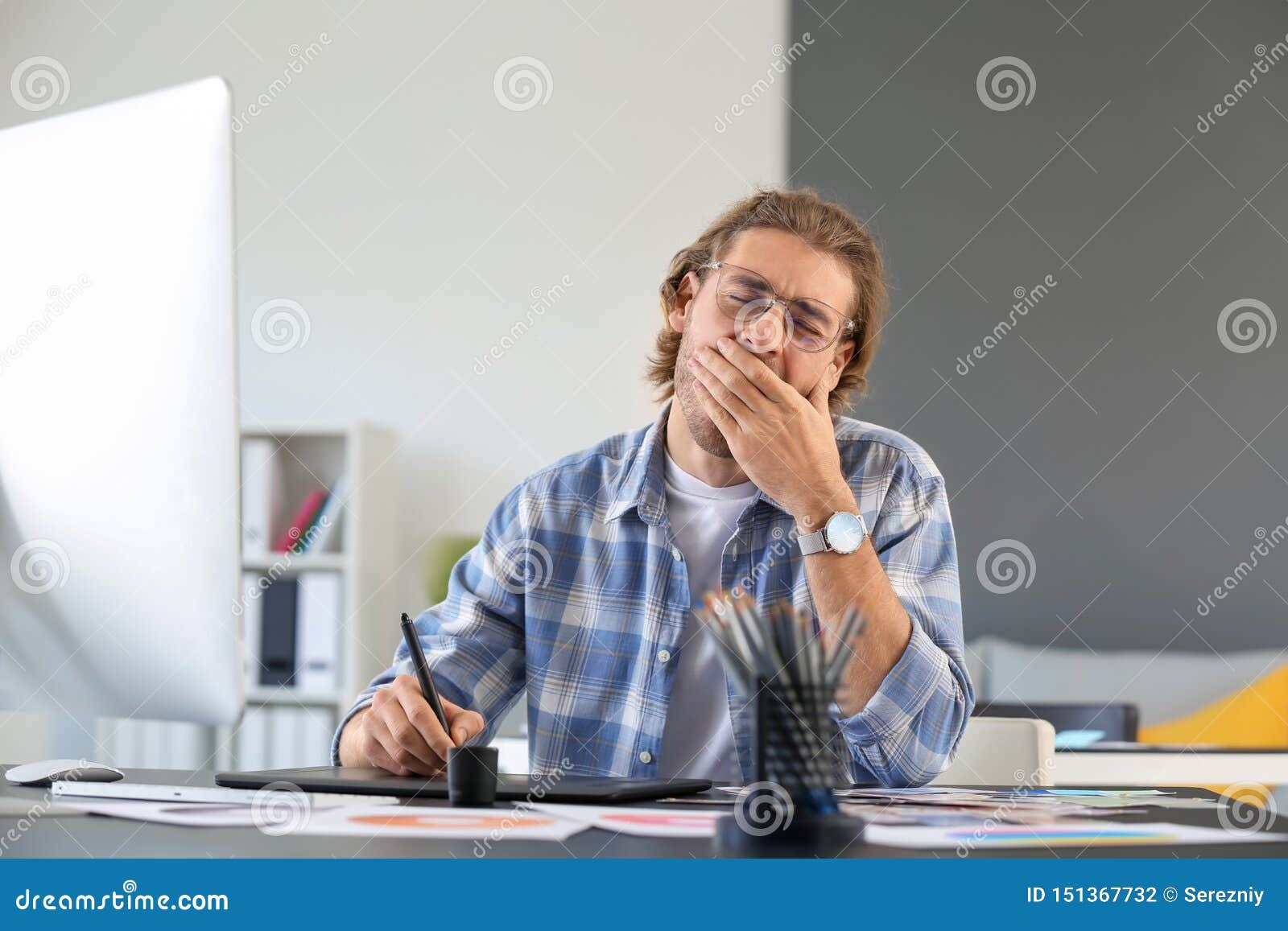 Tired Young Designer Working in Office Stock Photo - Image of tablet ...