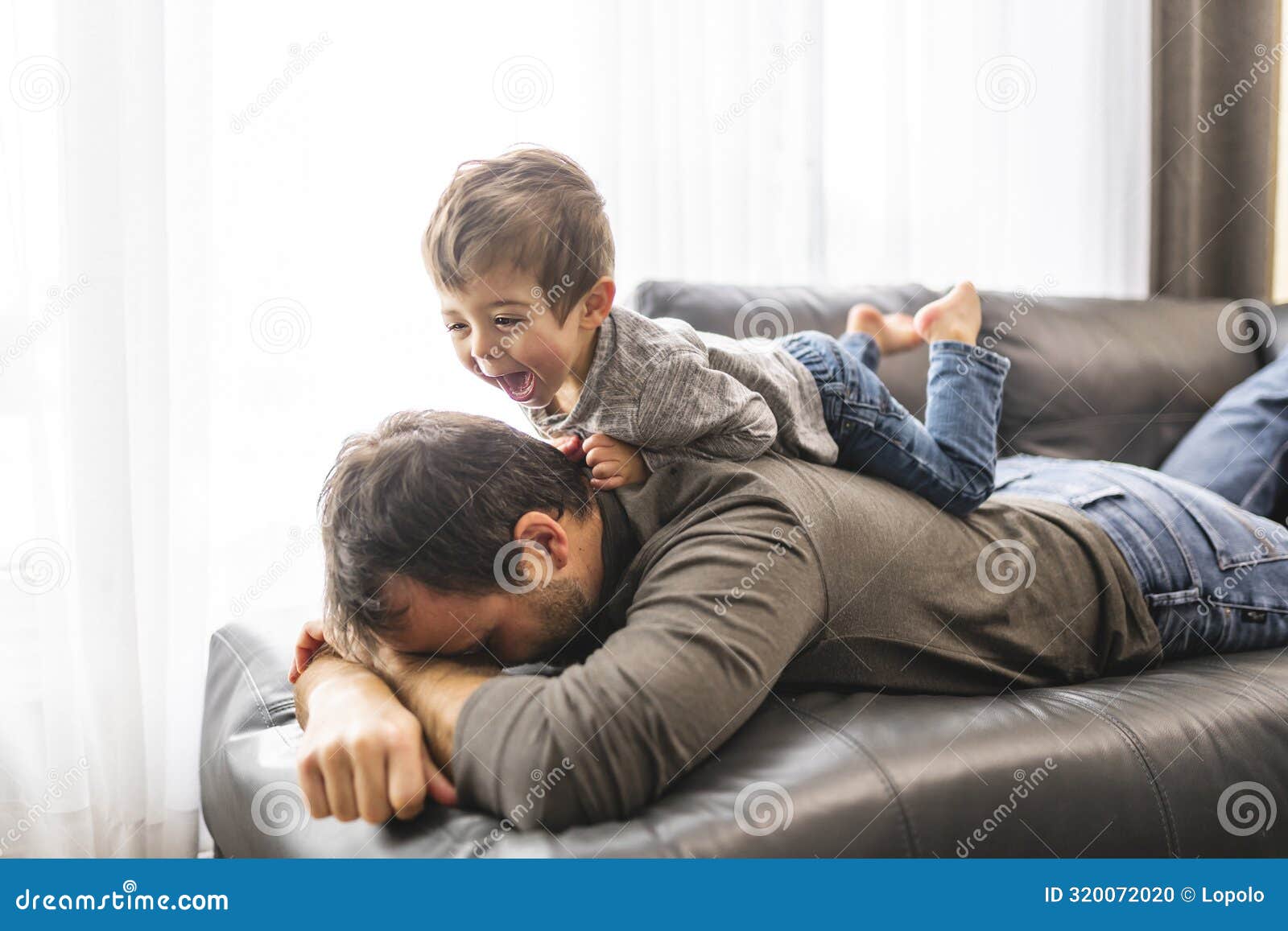 Tired Young Father with Boy on Back a Concept of Hyperactive Children ...