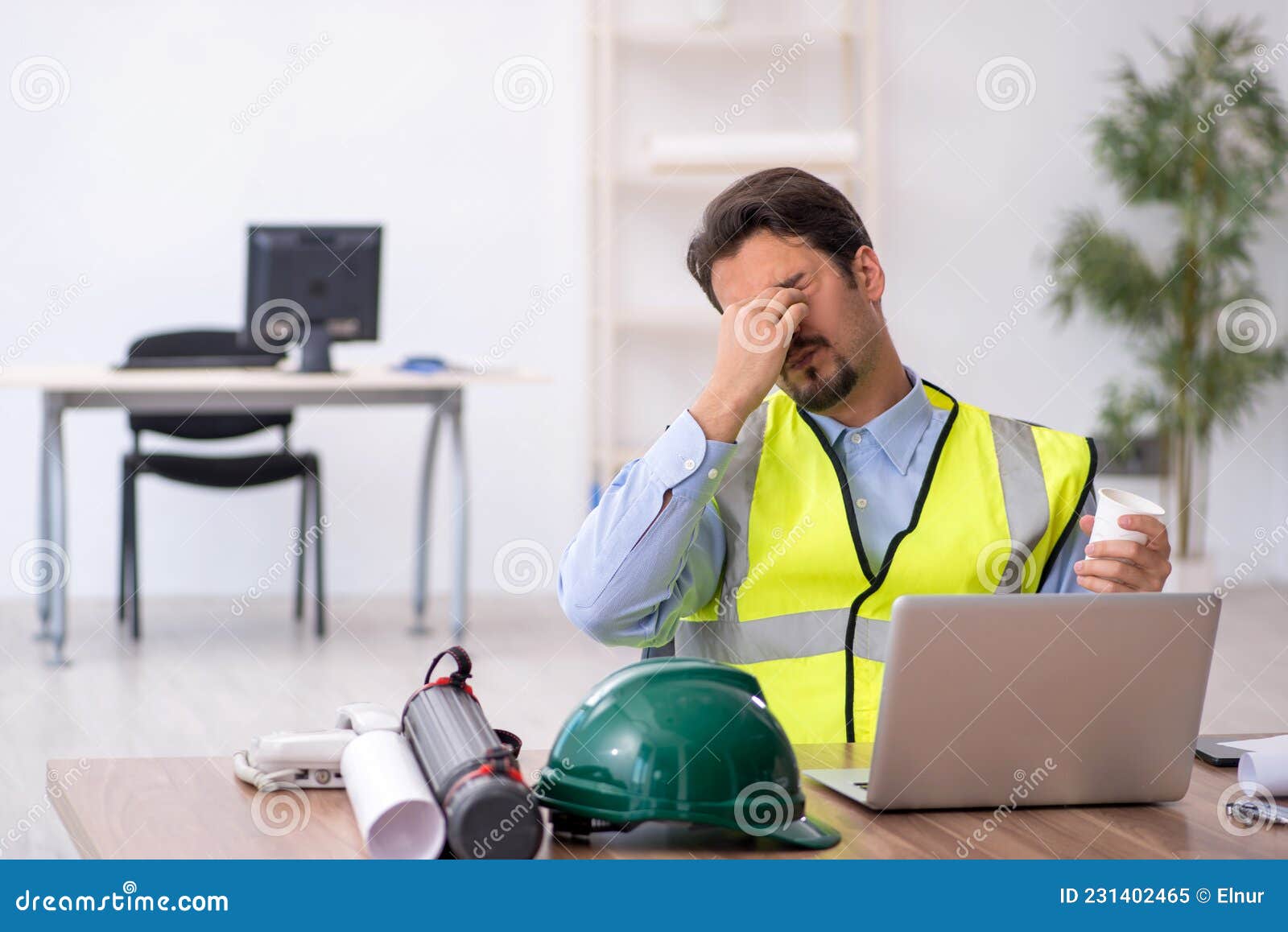 Tired Young Male Architect Drinking Coffee during Break Stock Image ...