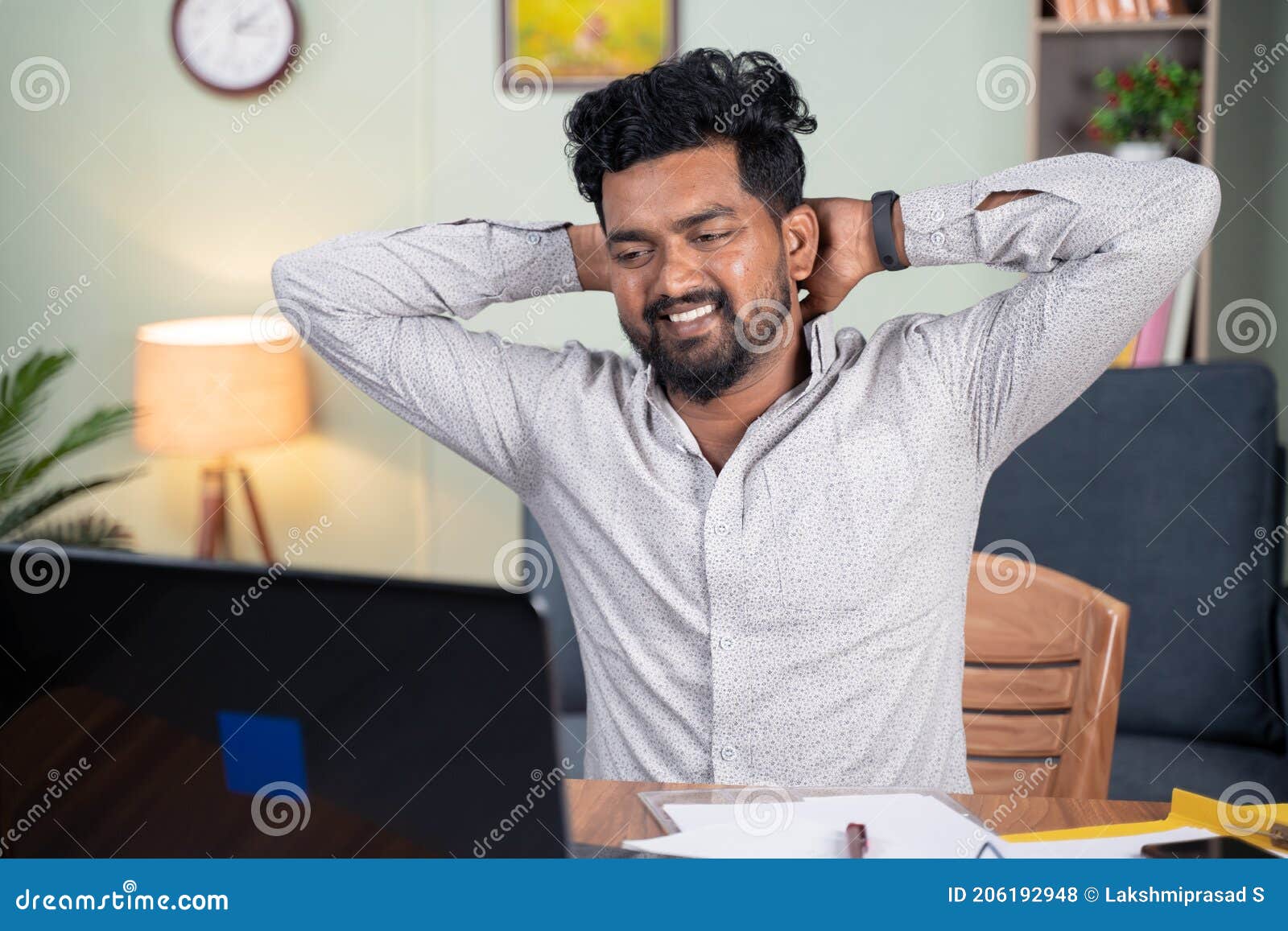 Tired Young Man Feeling Relief after Completion Work by Holding Hands ...