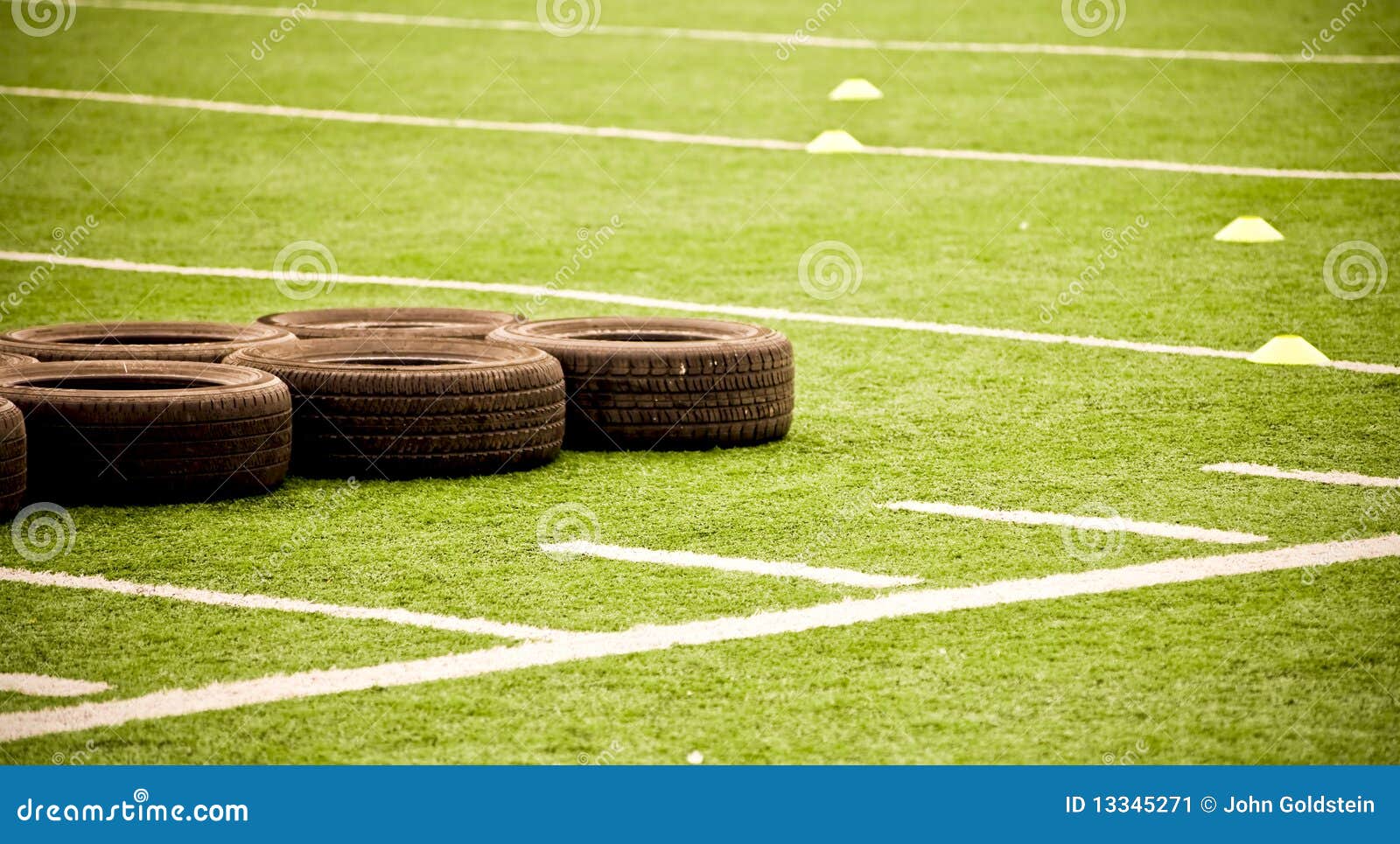 Tires on Football Field stock image. Image of football - 13345271