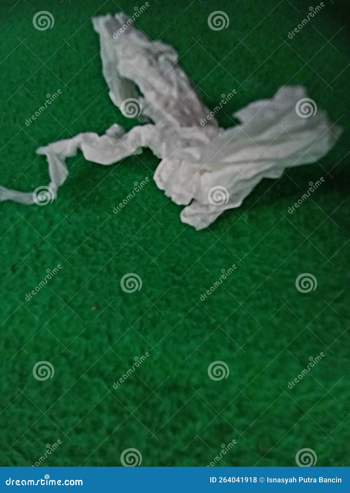 Tissue Waste Scattered on the Green Floor Stock Photo - Image of hand ...