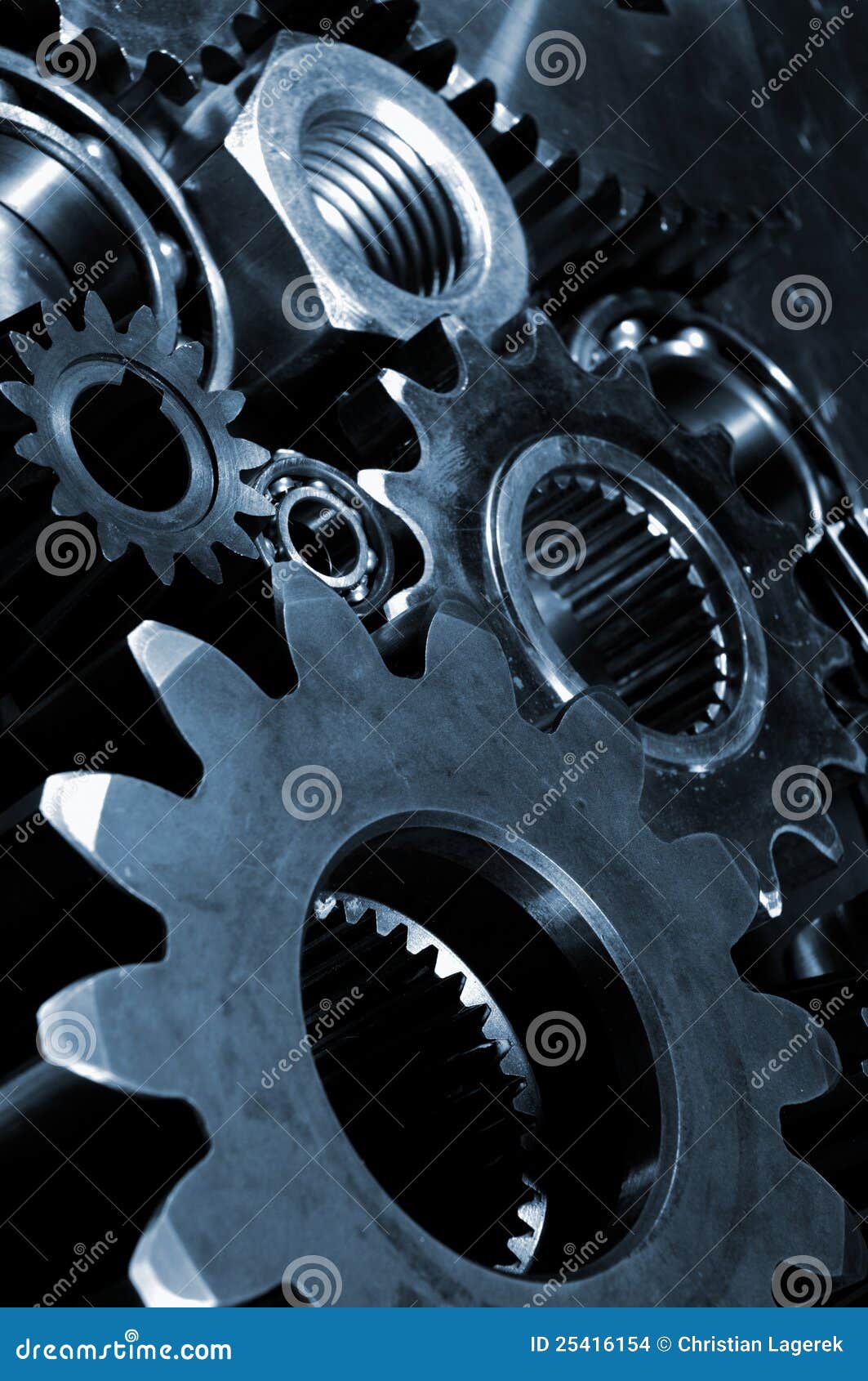 Titanium gears and cogs stock photo. Image of gears, reflecting - 25416154