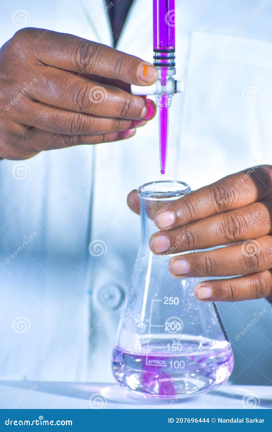 Titration with Color Solution in Chemistry Lab Stock Photo - Image of ...