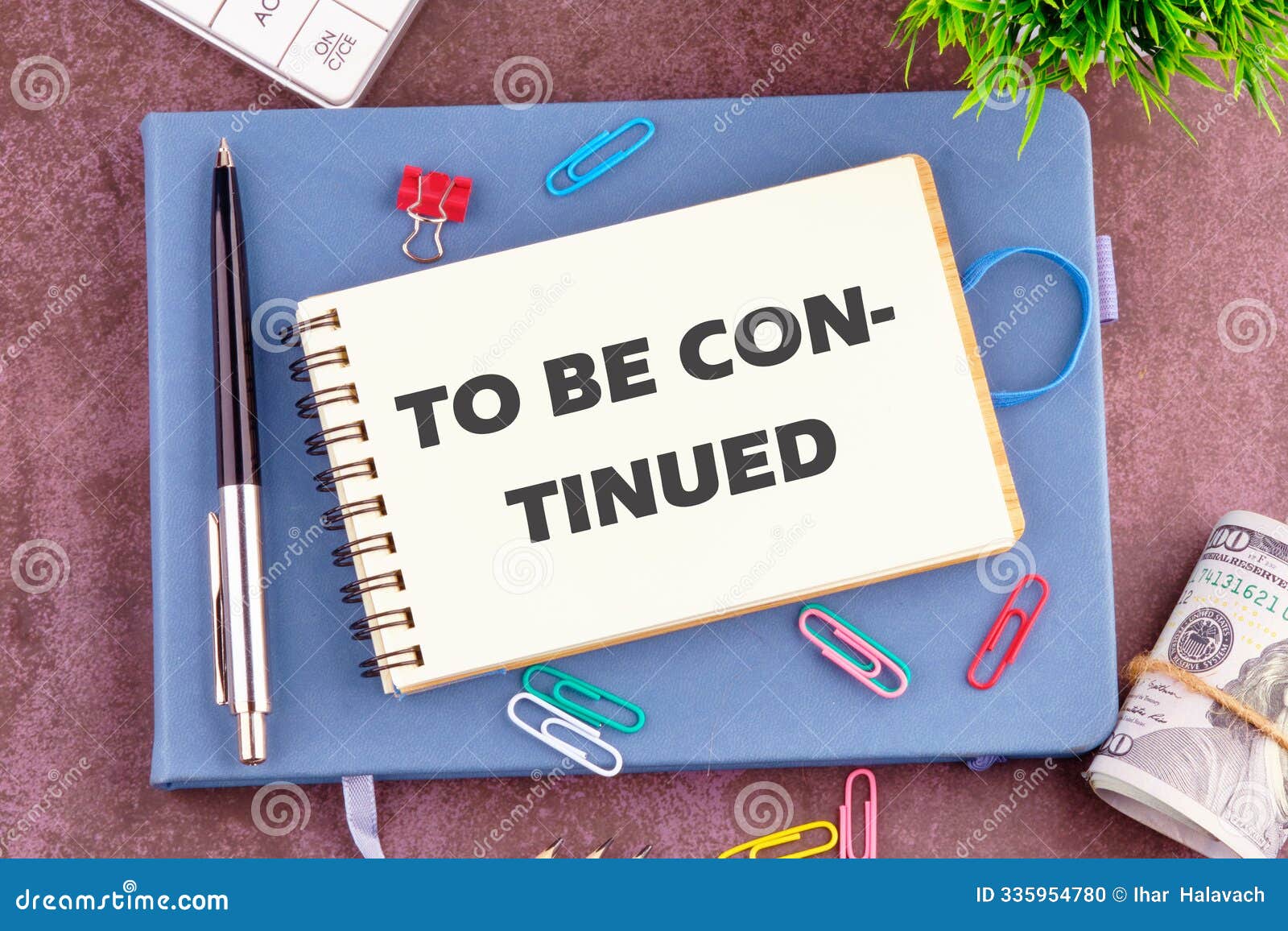 TO BE CONTINUED Text Written in a Notebook in a Composition with Office ...