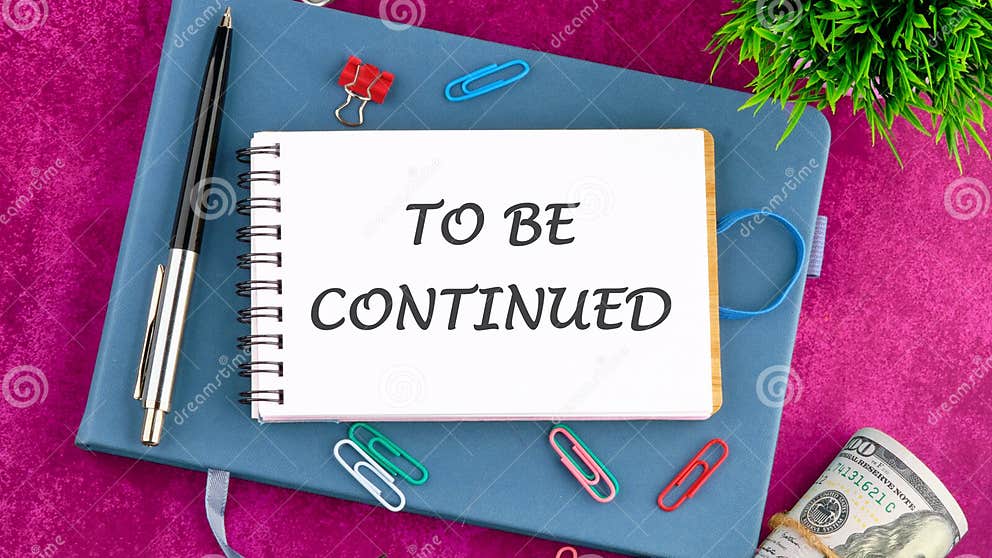 TO BE CONTINUED Text Written in a Notebook in Front of an Abstract ...