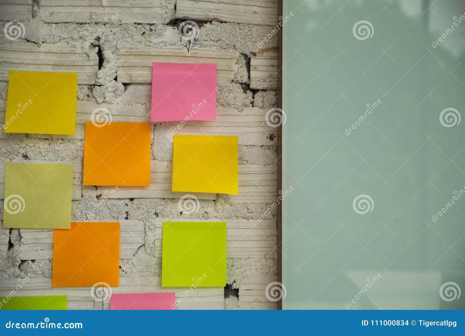 A To Do List with Colorful Note Papers on Glass Wall Stock Photo ...