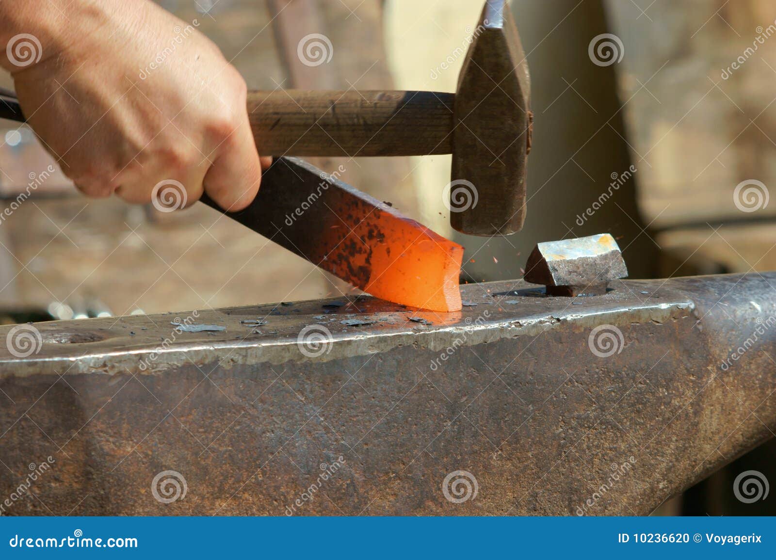 To Strike while the Iron is Hot Stock Photo - Image of tool, anvil ...