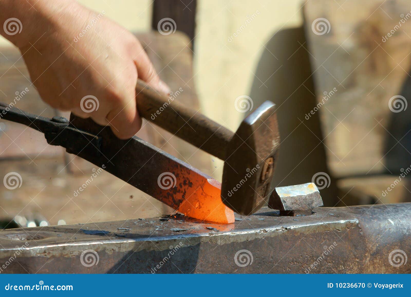 To Strike while the Iron is Hot Stock Photo - Image of metal, hand ...