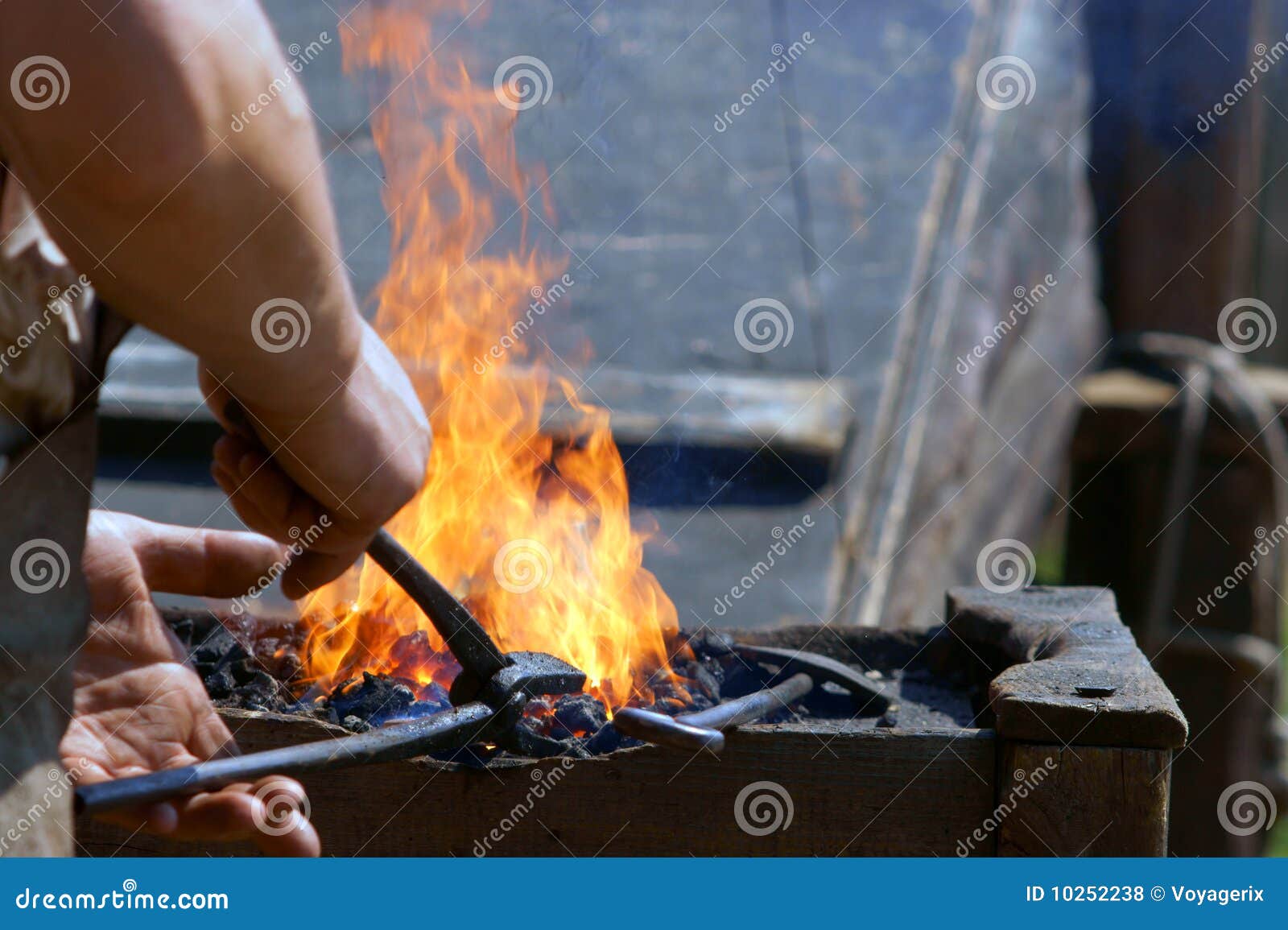 To Strike while the Iron is Hot Stock Photo - Image of strength, anvil ...