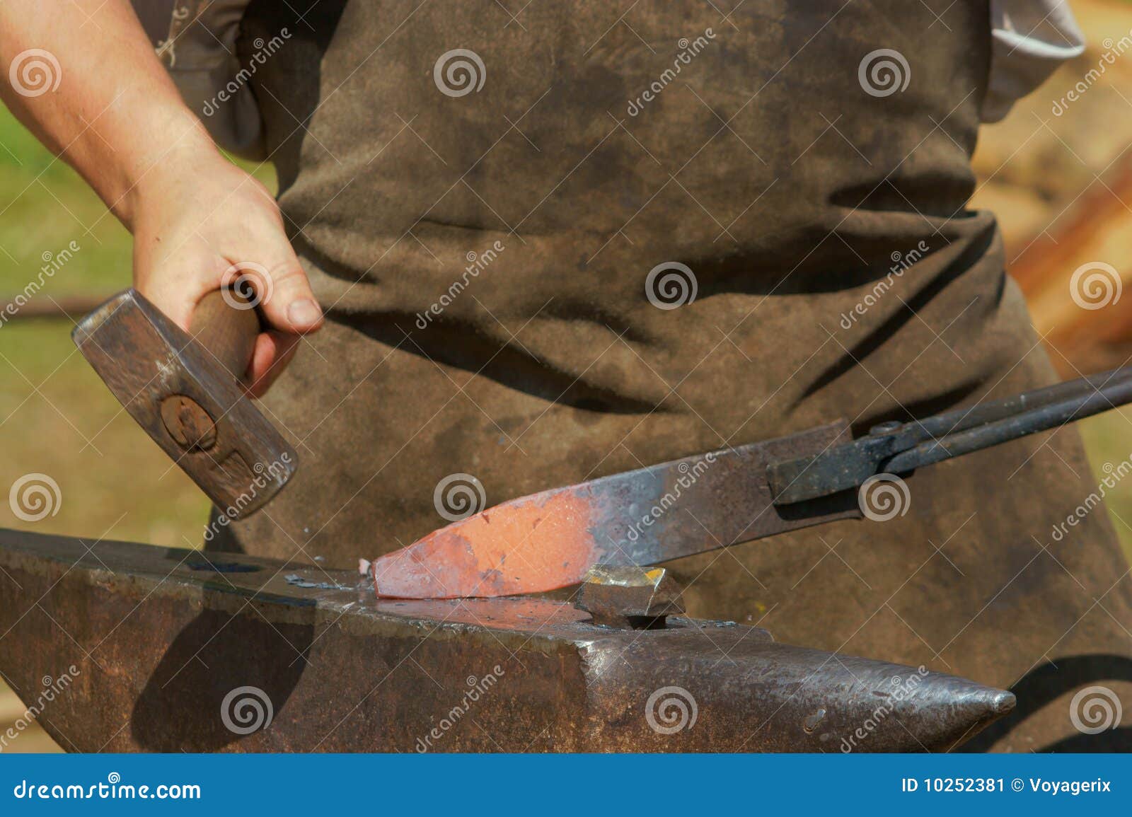 To Strike while the Iron is Hot Stock Image - Image of industrial, hand ...