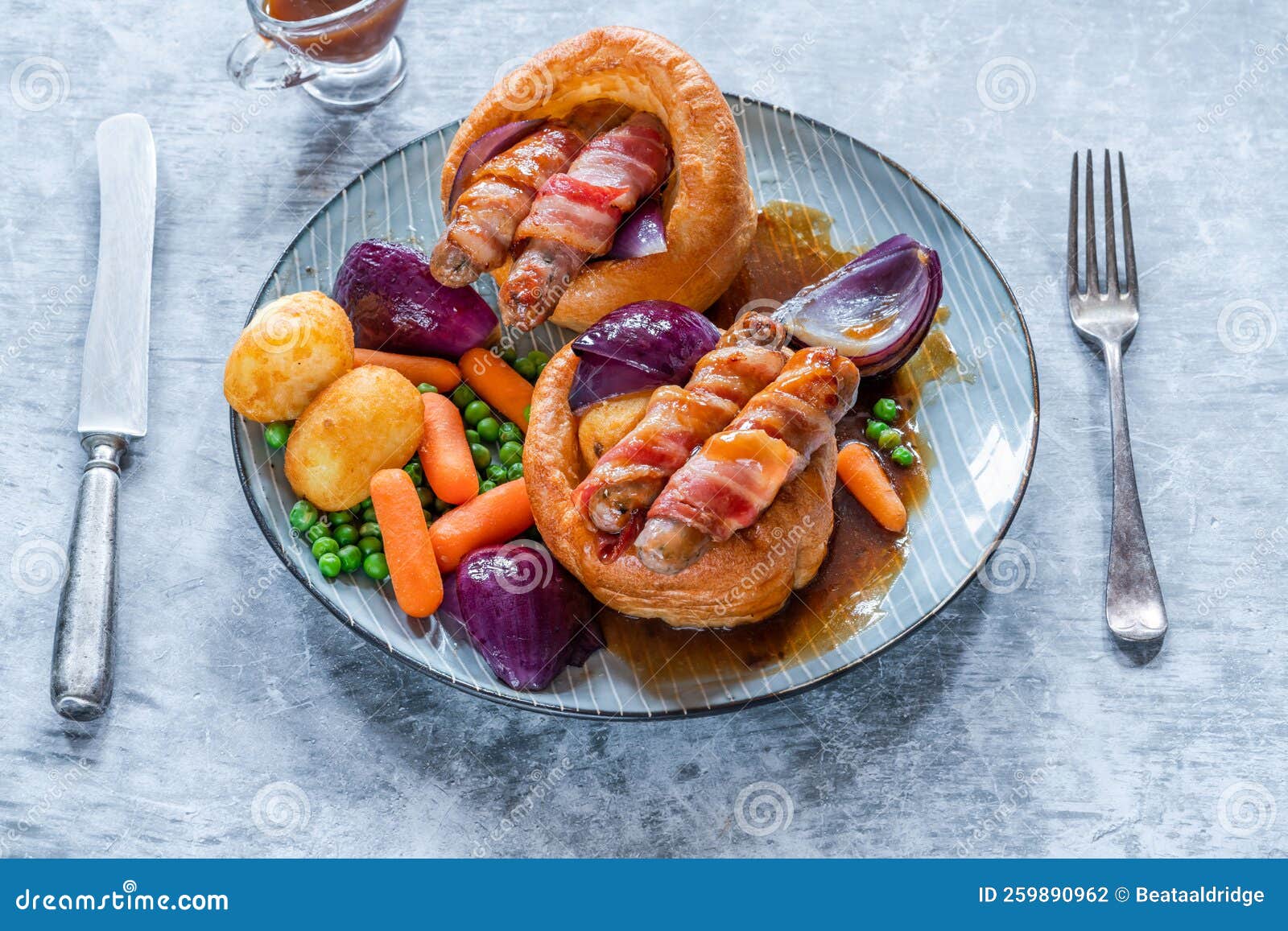 Toad-in-the-hole stock photo. Image of meal, roasted - 259890962
