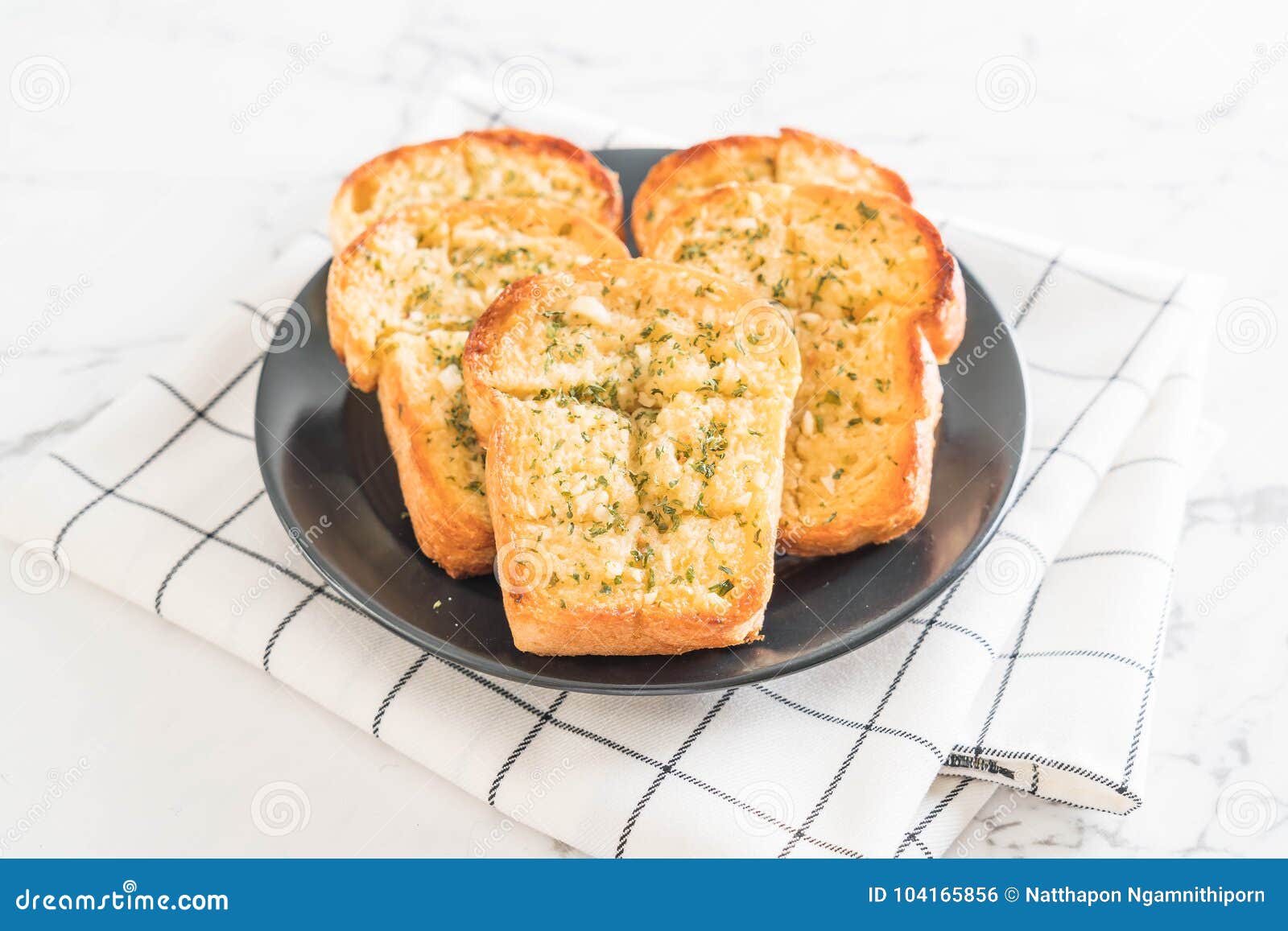 Garlic bread on plate stock photo. Image of french, crusty - 104165856