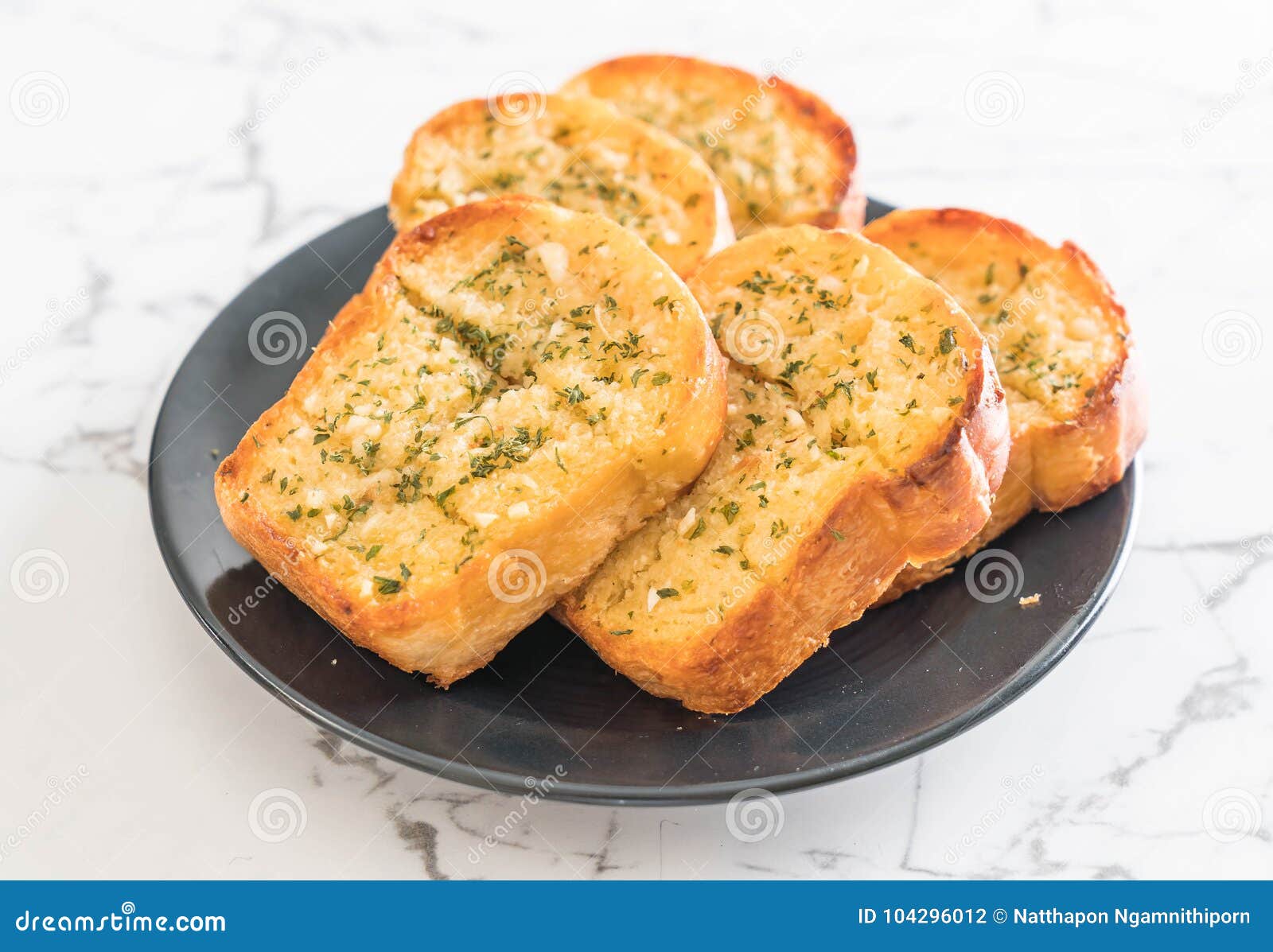 Garlic bread on plate stock photo. Image of white, french - 104296012