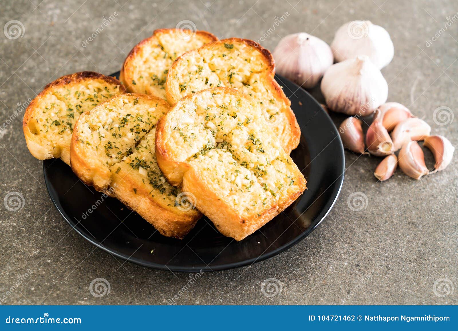 Garlic bread on plate stock photo. Image of crispy, tasty - 104721462