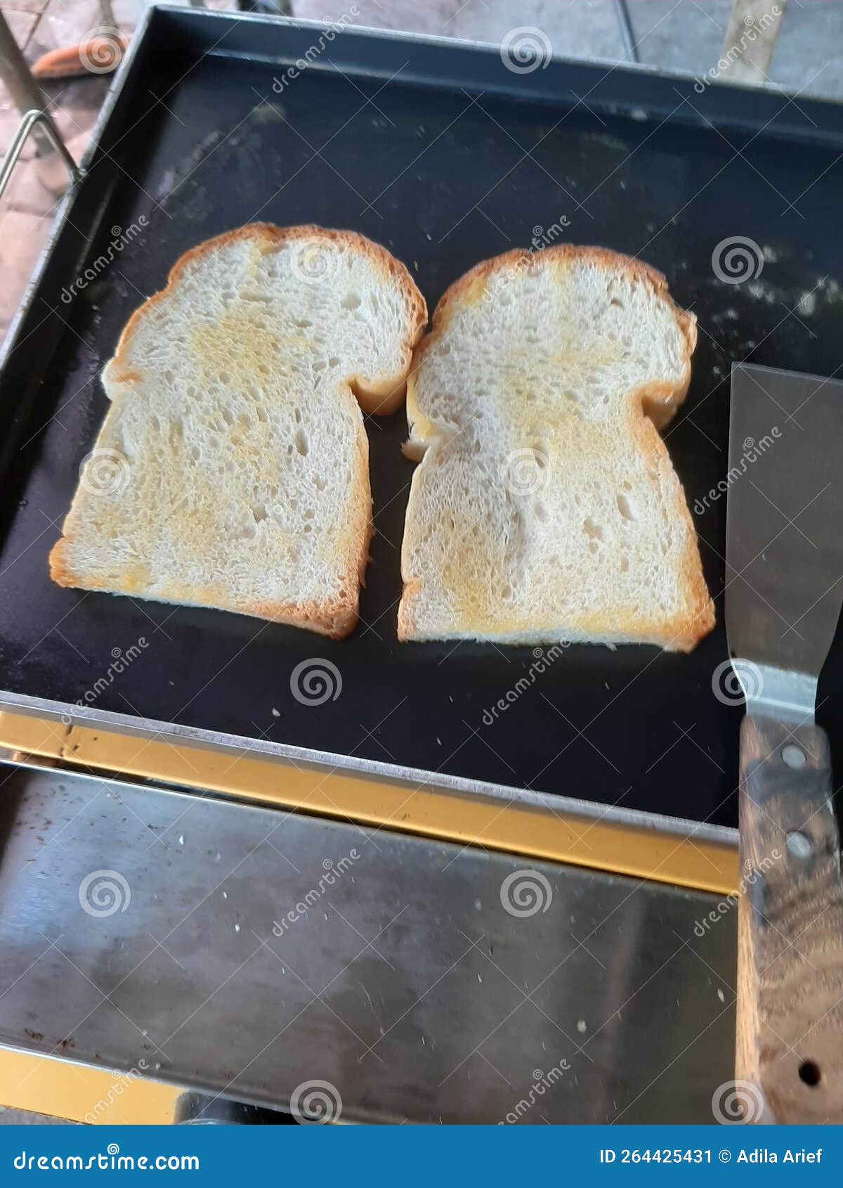 Toast on a griddle stock image. Image of icing, cake - 264425431