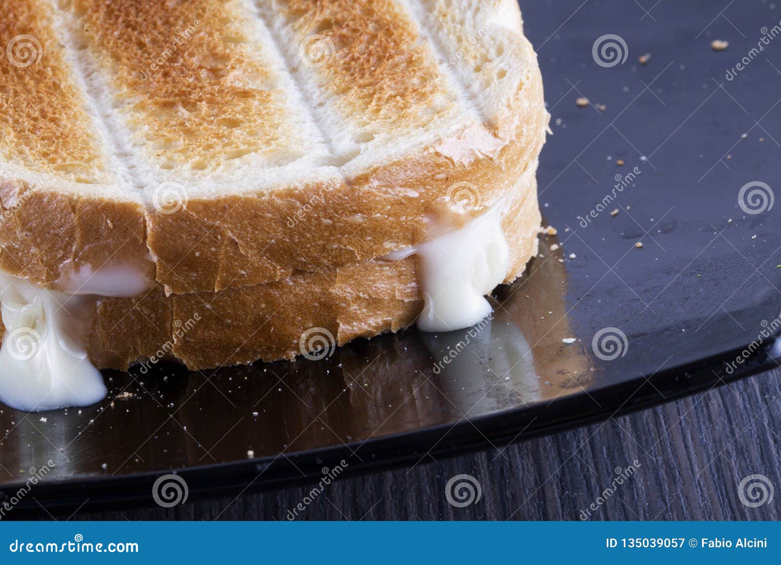 Toast with melting cheese stock image. Image of dessert - 135039057