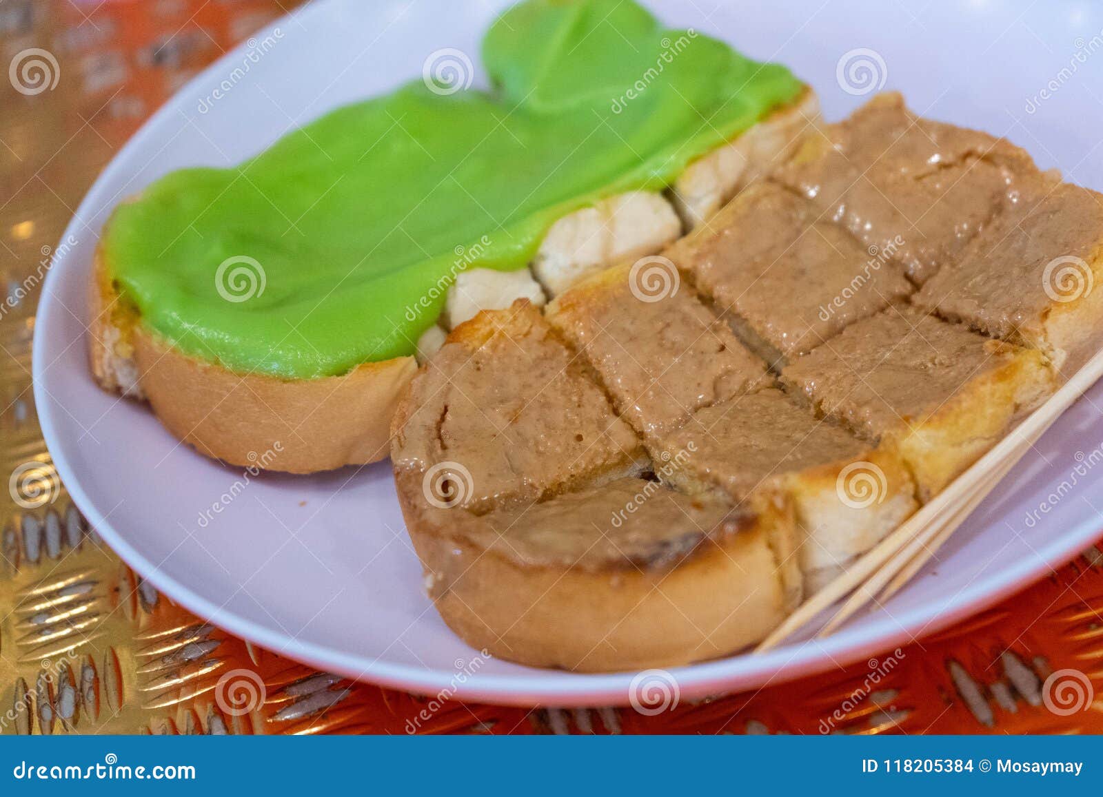 Toast with Thai Pandan Custard and Chocolate Custard on Plate Stock ...