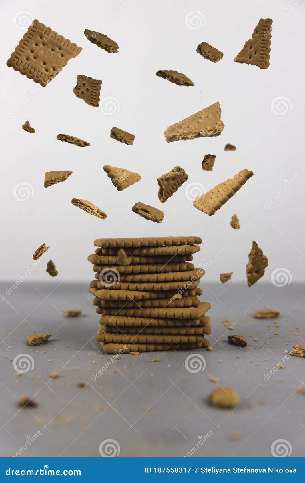 Toasted Biscuits Floating. Broken Pieces Falling and Stack of Biscuits ...