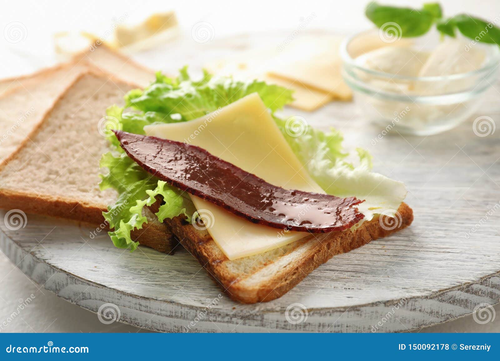 Toasted Bread with Meat and Cheese on Wooden Board Stock Photo - Image ...