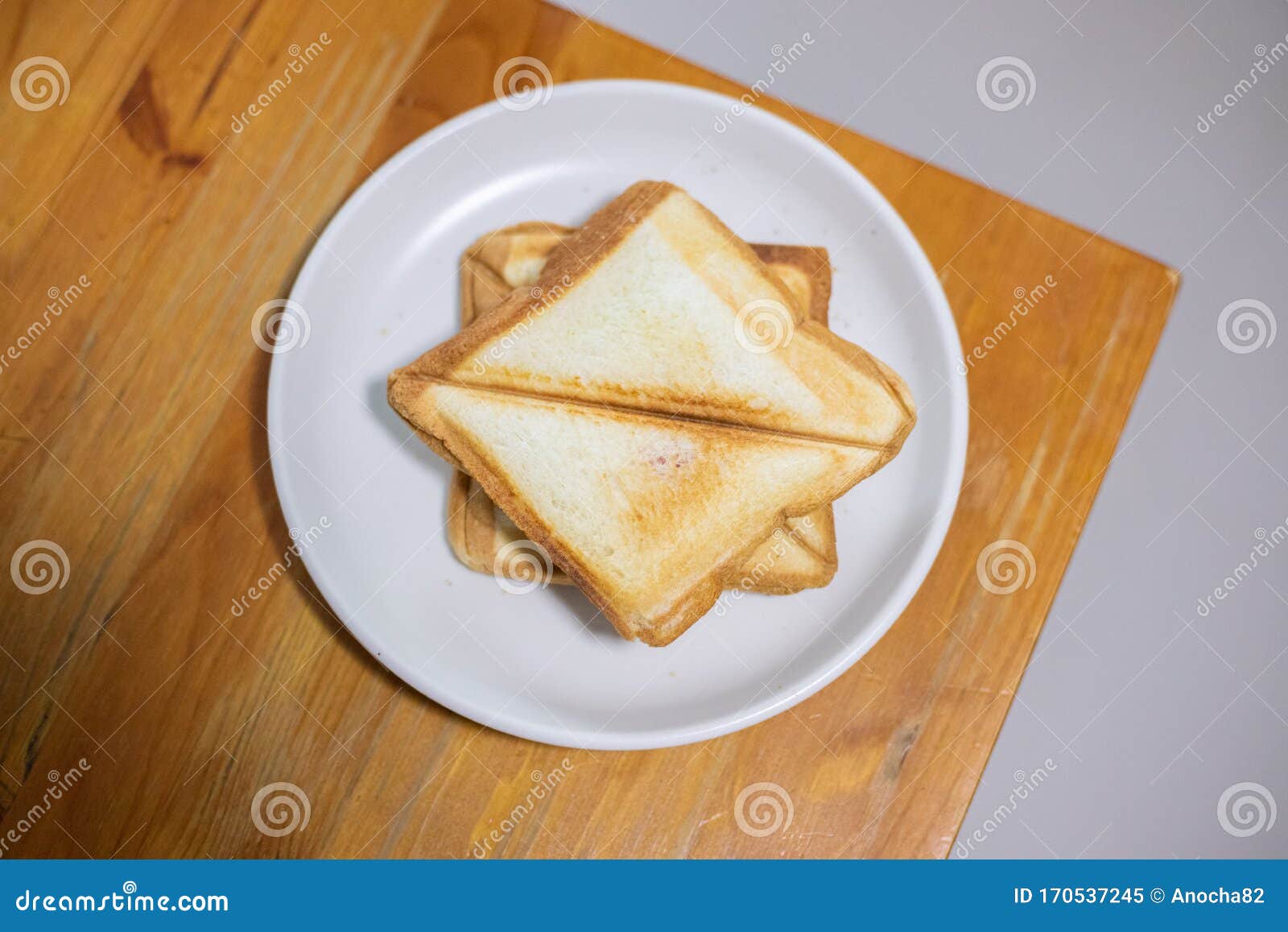 Toasted Bread Photos, on a White Plate. Stock Image - Image of food ...