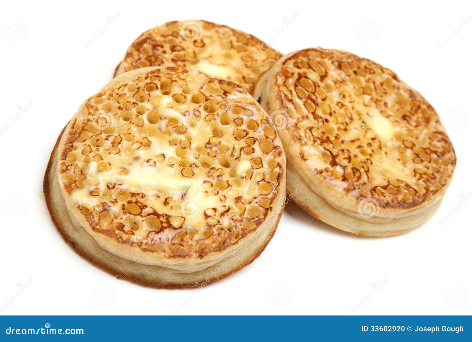 Toasted Crumpets with Butter Isolated on White Stock Photo - Image of ...