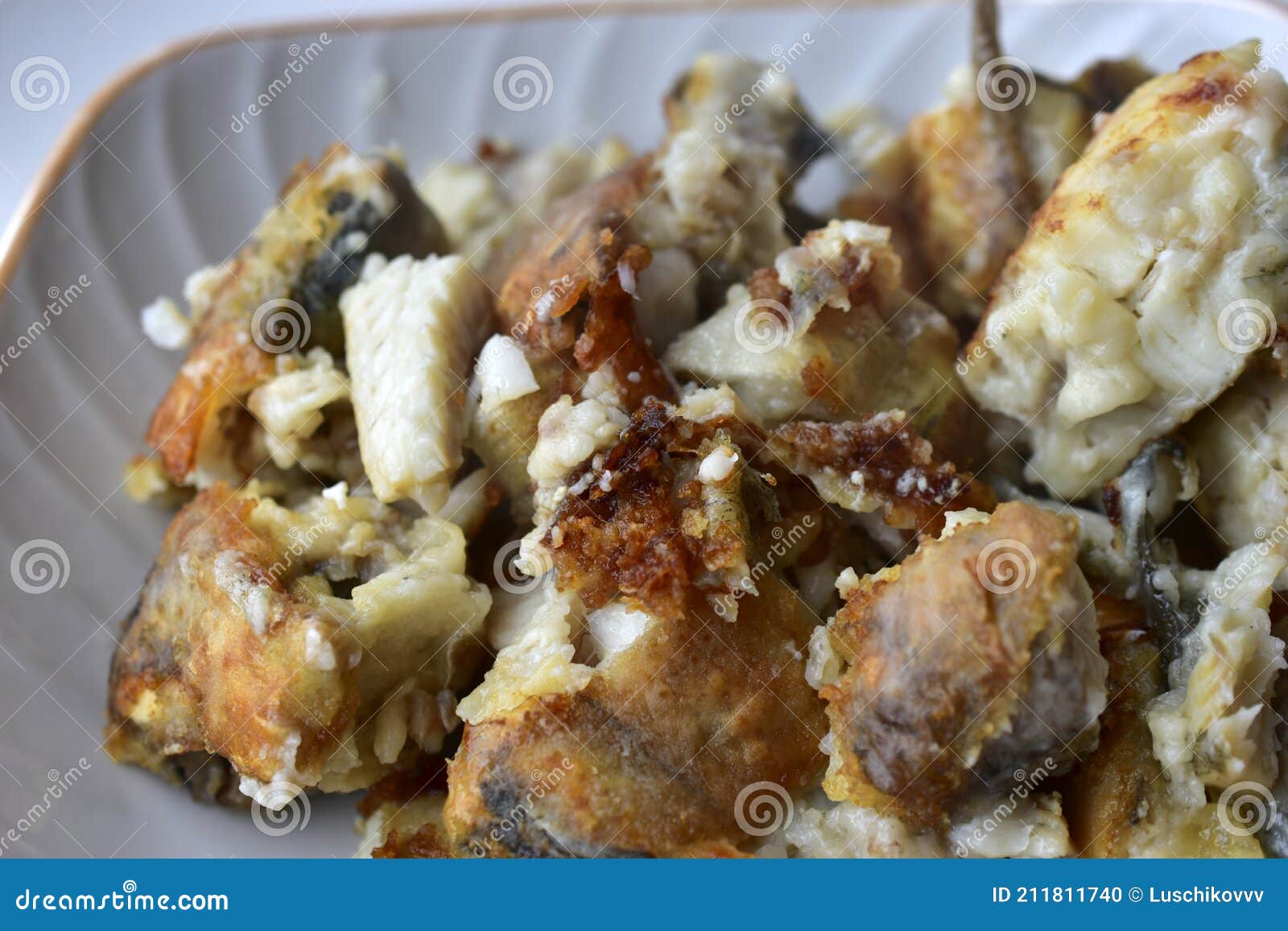 Toasted Delicious Pollock Fish in a Plate in the Kitchen Stock Photo ...