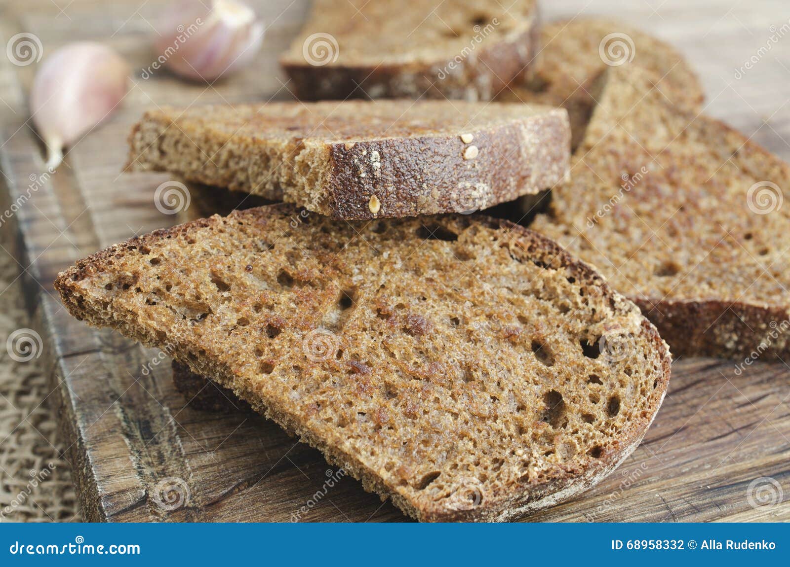Toasted Rye Bread on a Wooden Board. Rustic Style. Stock Photo - Image ...