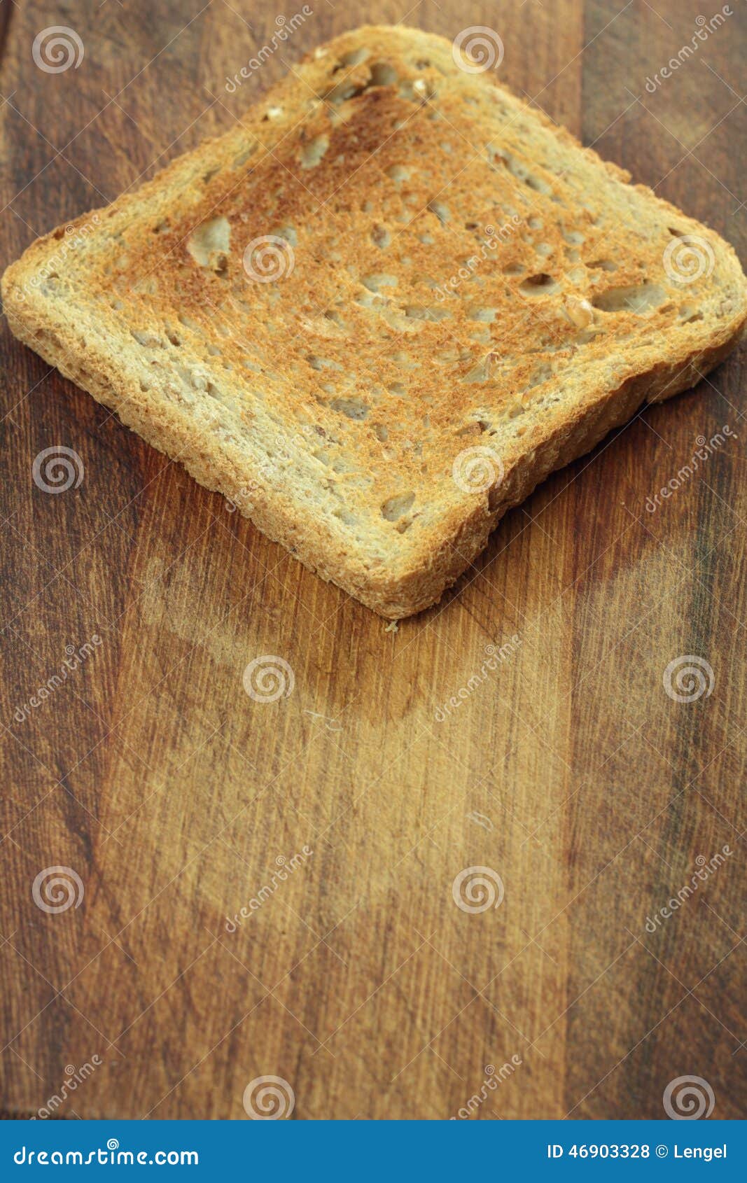 Toasted slice of bread. stock photo. Image of cutting - 46903328