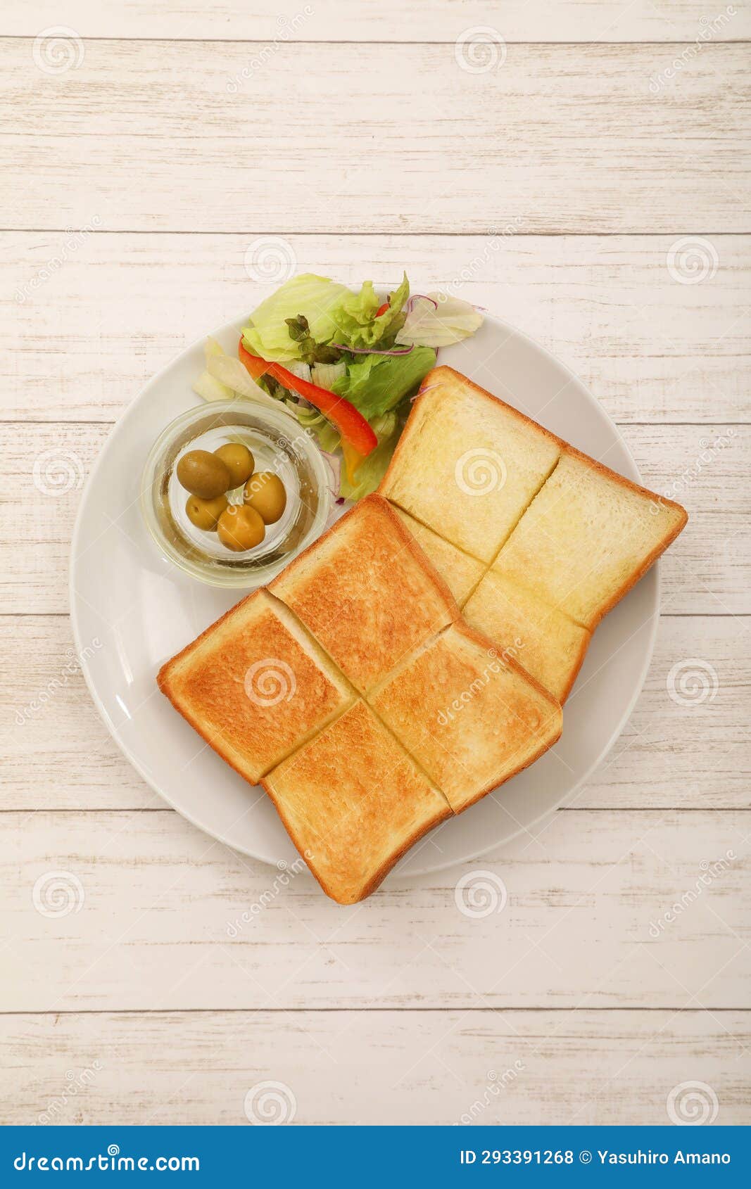 Toasted Square Slices of Bread. Served with Olives. Stock Photo - Image ...