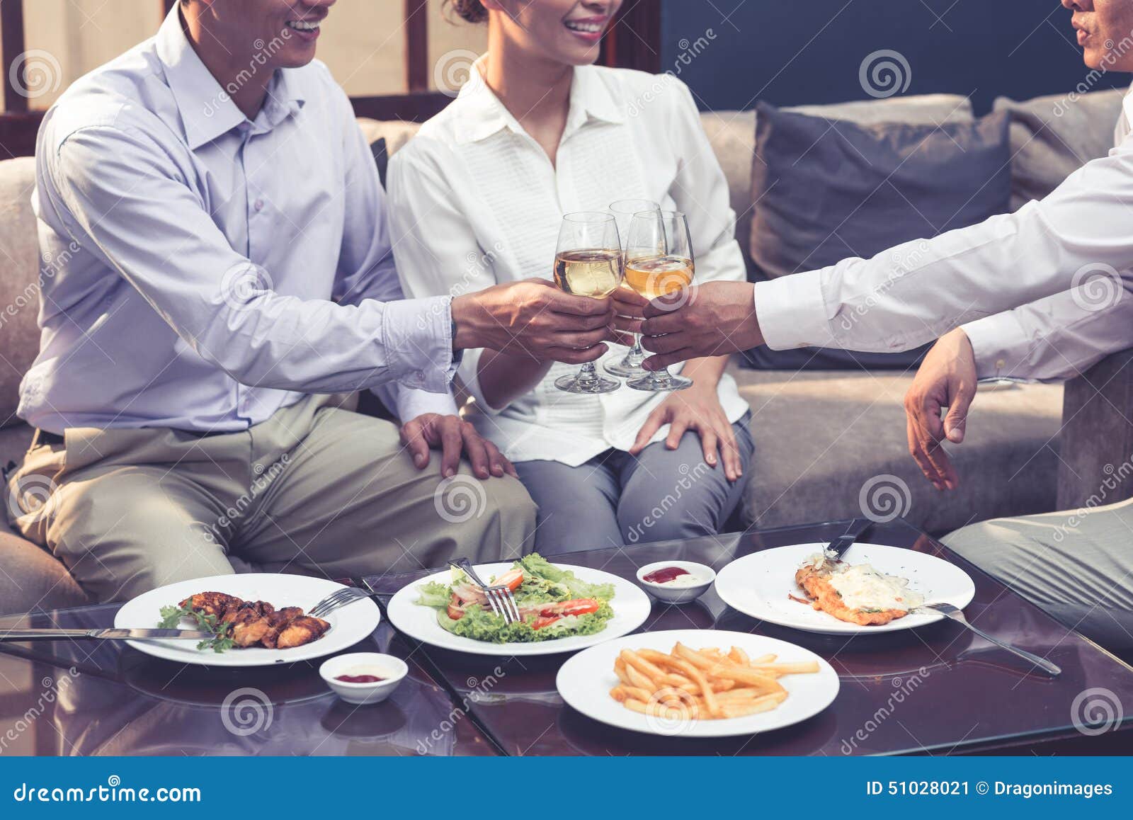 Toasting at the dinner stock image. Image of sitting - 51028021