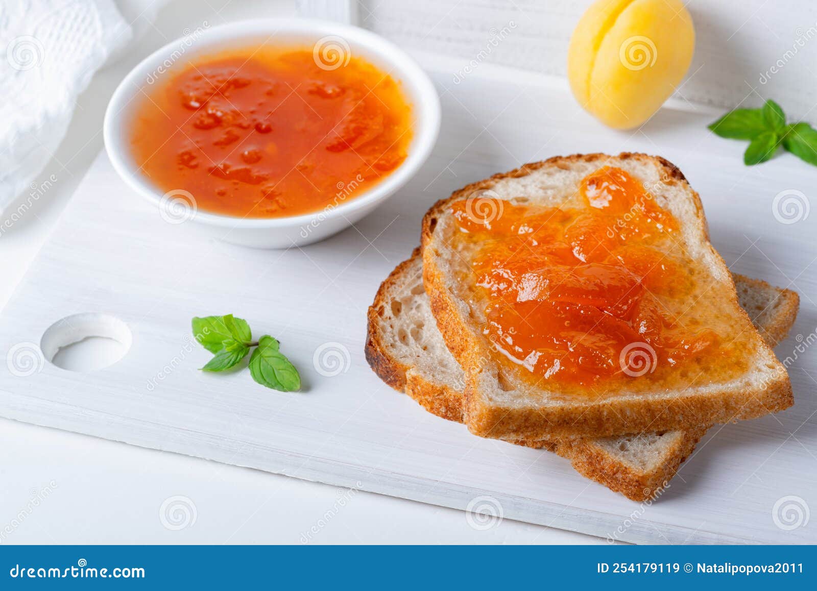 Toasts of Bread with Apricot Jam and Fresh Fruits with Mint Stock Image ...