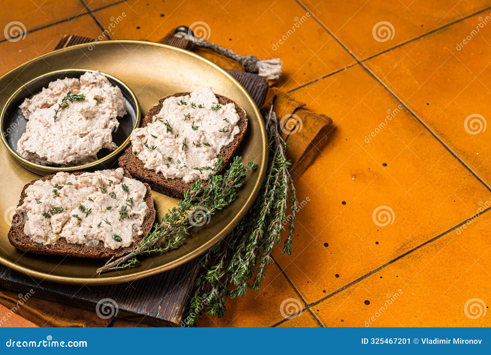 Toasts with Cod Liver Spread Pate on a Plate. Orange Background. Top ...