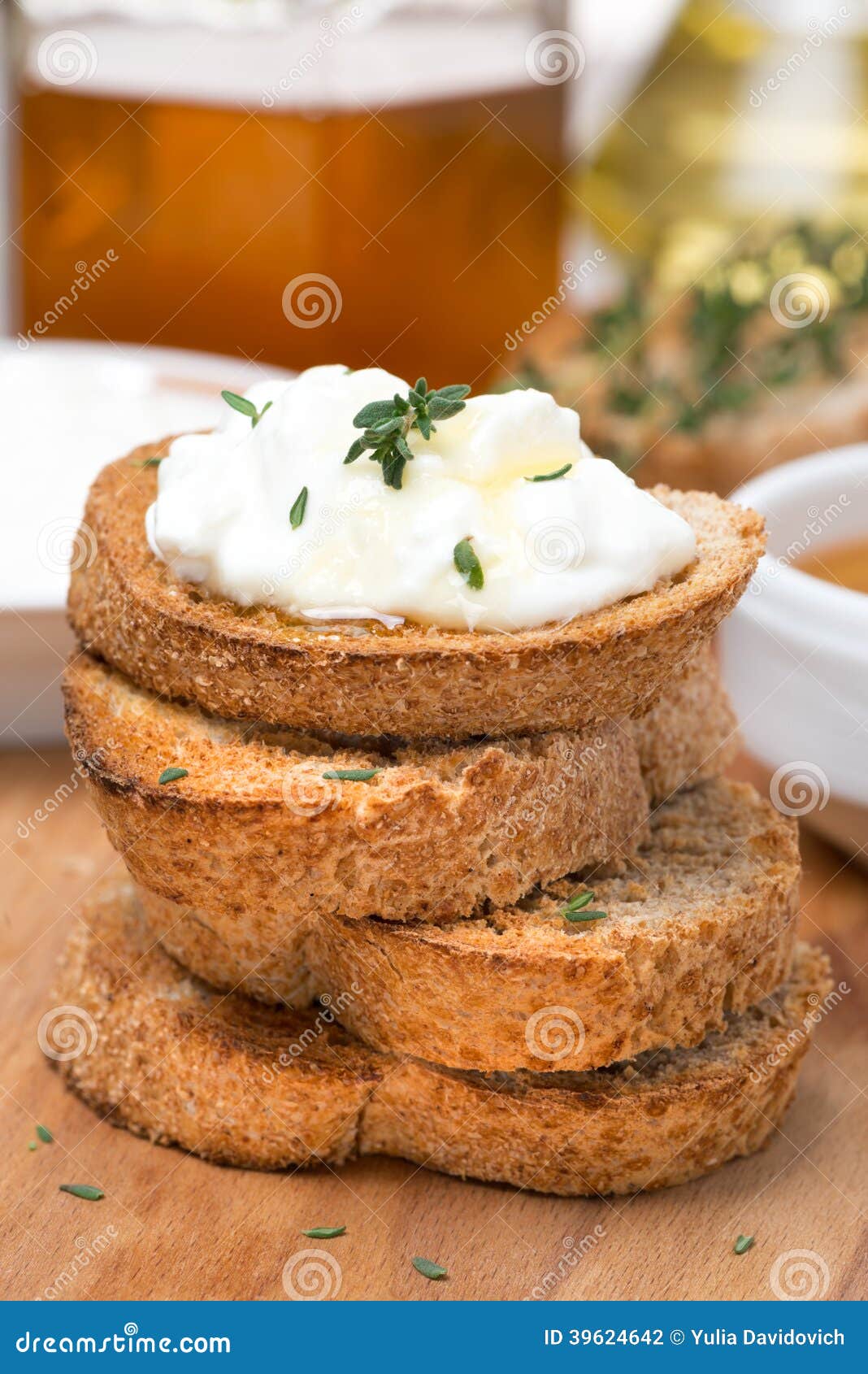 Toasts with Goat Cheese, Honey and Thyme, Vertical Stock Photo - Image ...