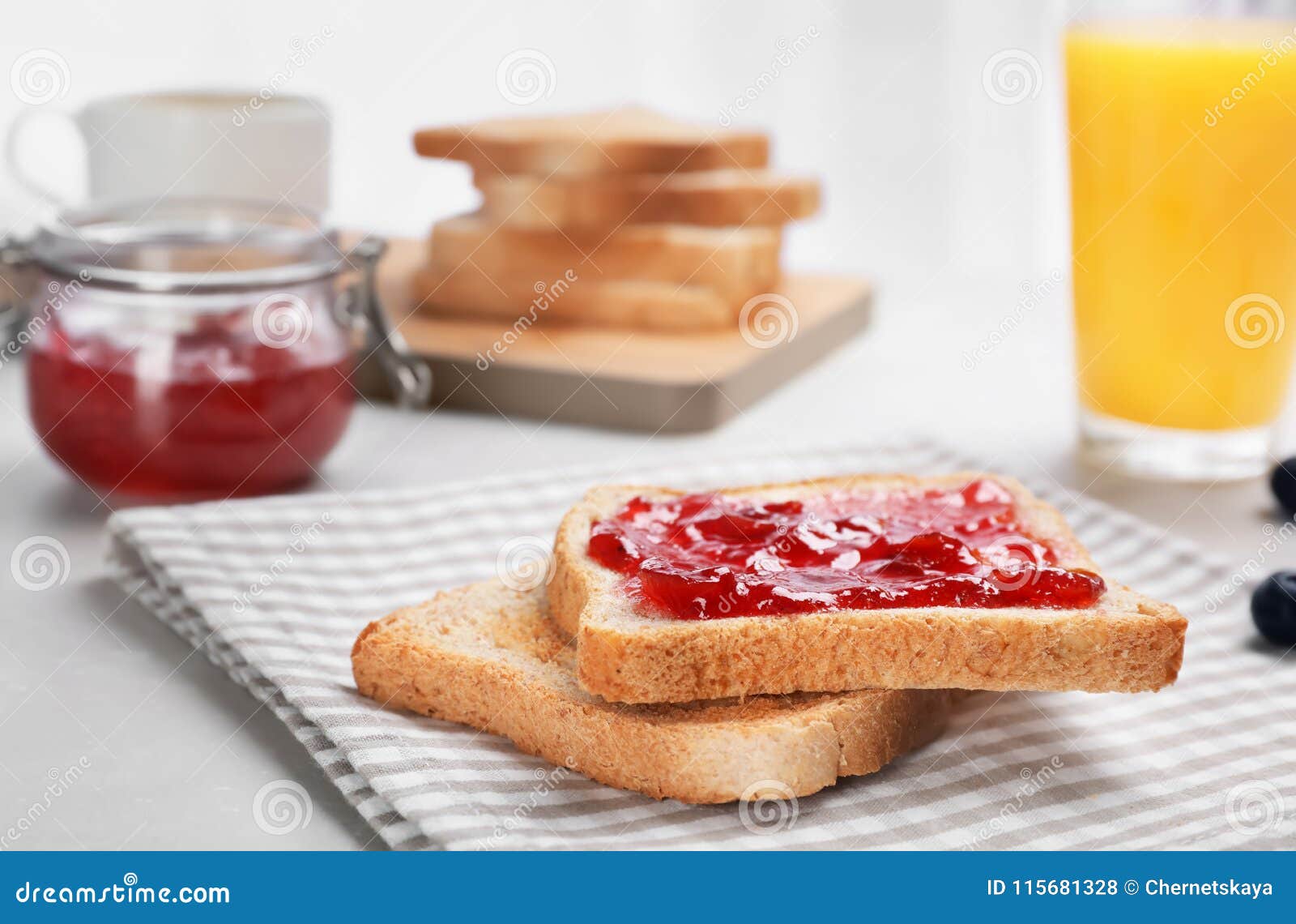 Toasts with jam on table stock photo. Image of dessert - 115681328