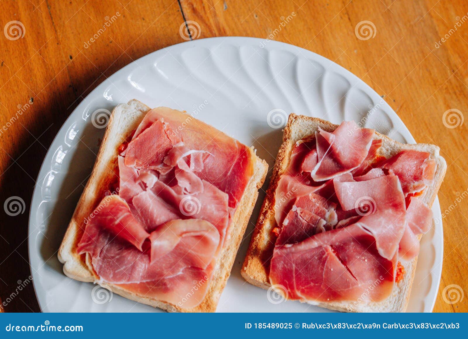 Toasts with Serrano Ham, Traditional Spanish Breakfast Stock Image ...