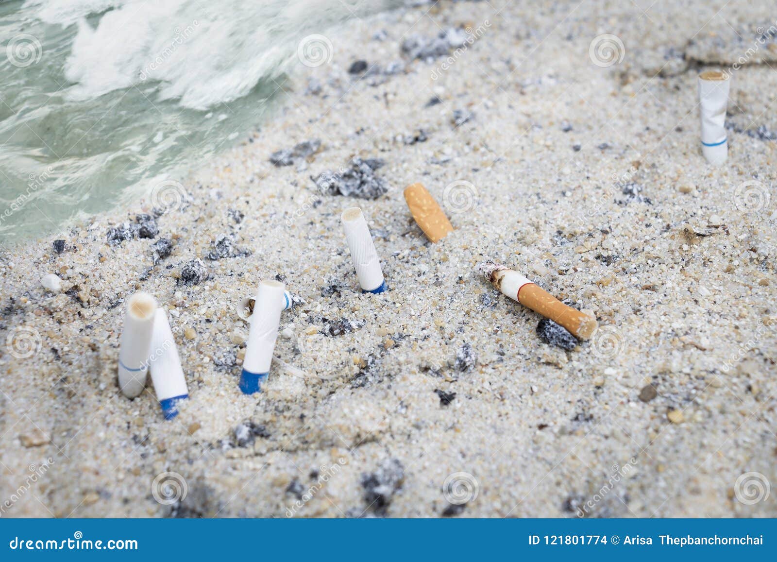 Tobacco Cigarette a Lot of on the Beach Sand. Stock Photo - Image of ...