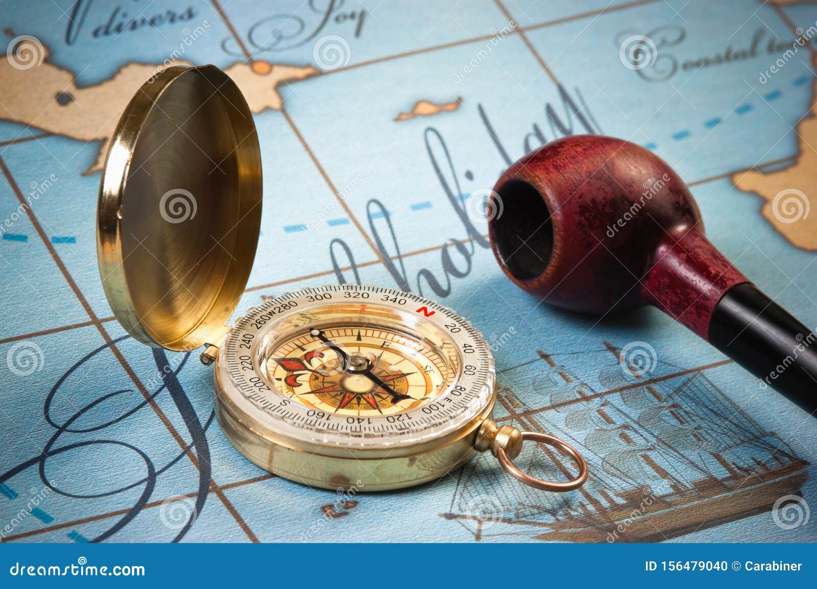 Tobacco Pipe and Compass on Map Stock Photo - Image of south, hiking ...